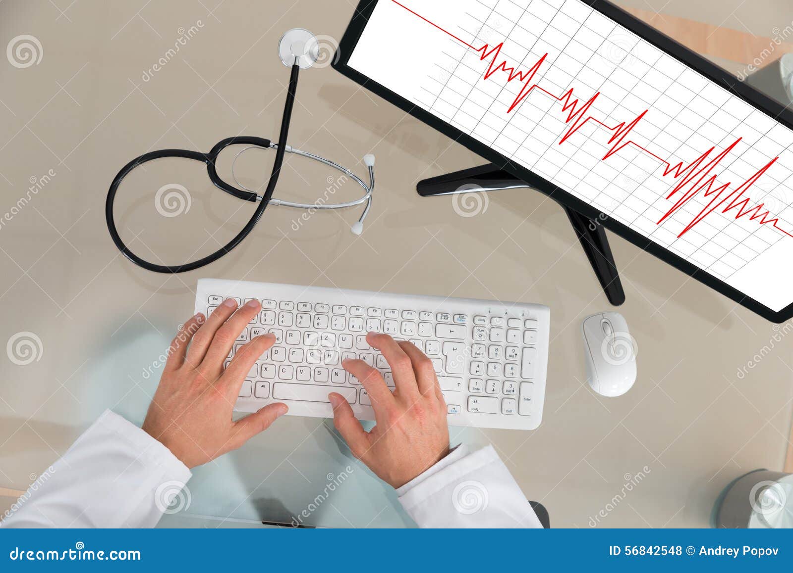Doctor with Computer Showing Cardiogram Stock Photo - Image of keyboard ...