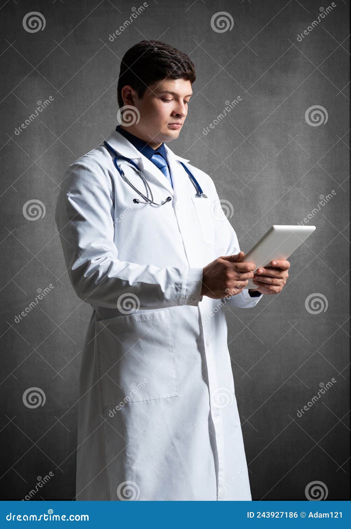 Doctor with a Computer Tablet Stock Photo - Image of person, smile ...