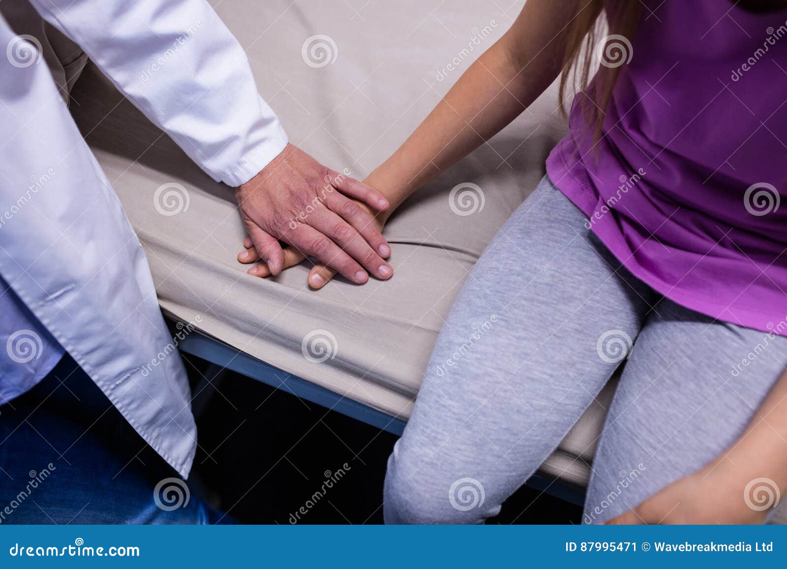 Doctor consoling a patient stock image. Image of health - 87995471