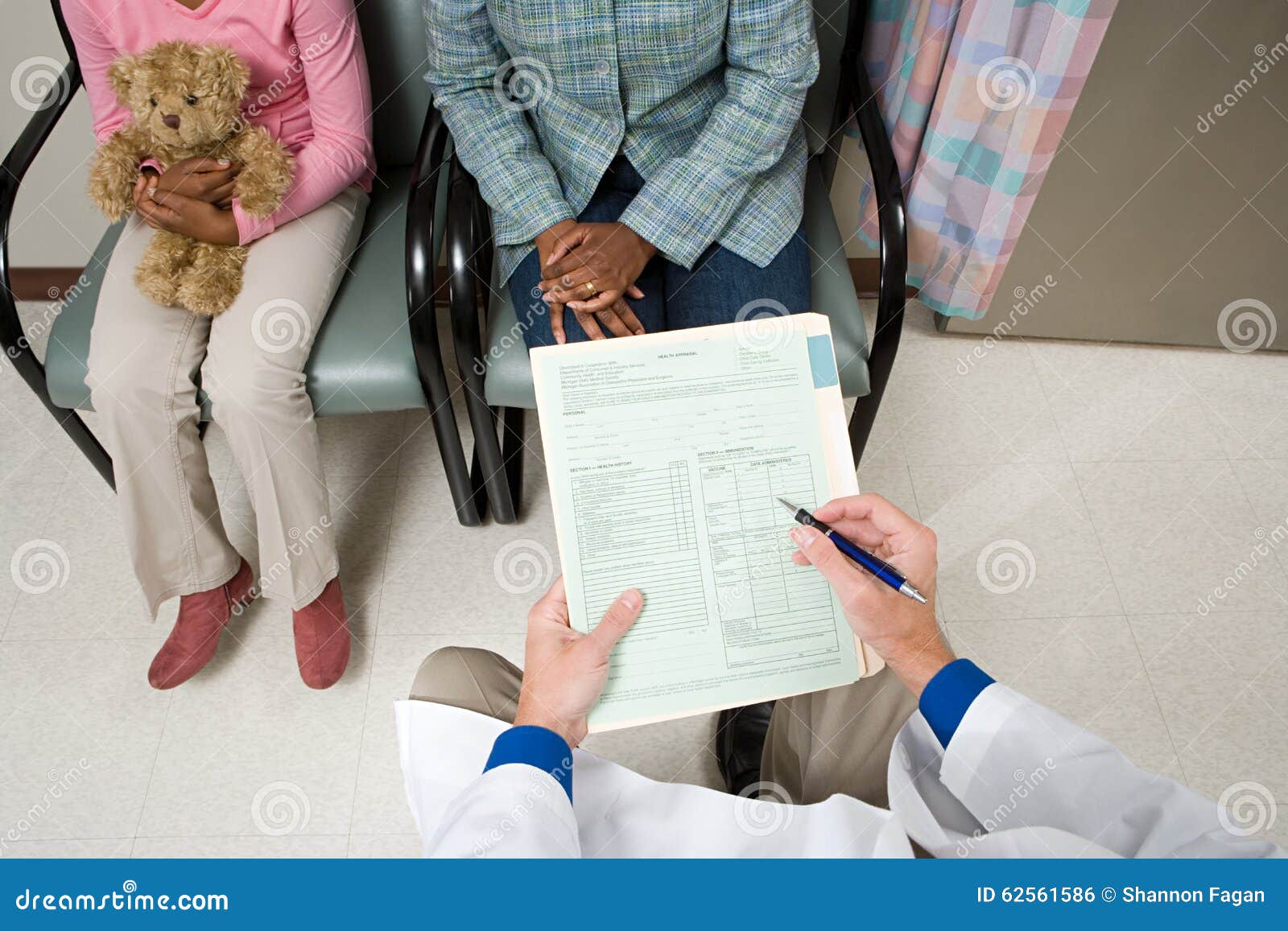 Doctor Consulting Parent and Child Stock Photo - Image of elevated ...
