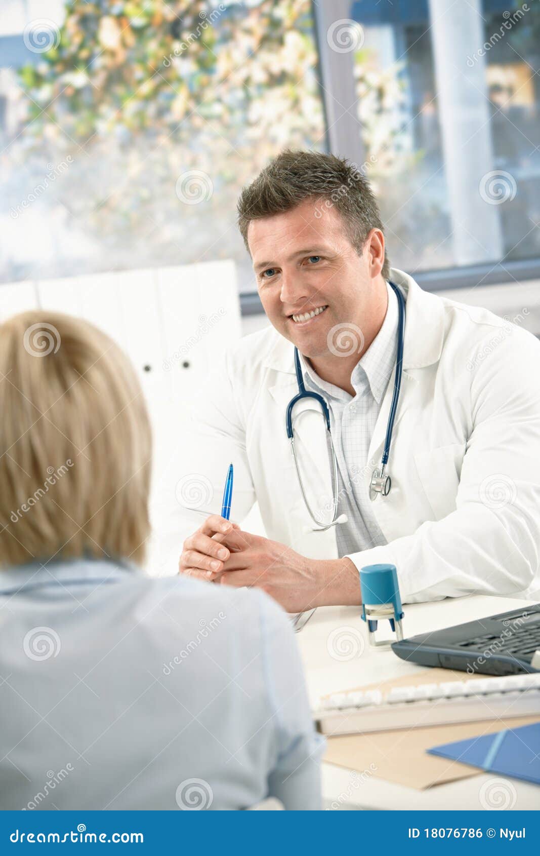 Doctor consulting patient stock photo. Image of happy - 18076786 Doctor consulting patient stock photo. Image of happy - 18076786