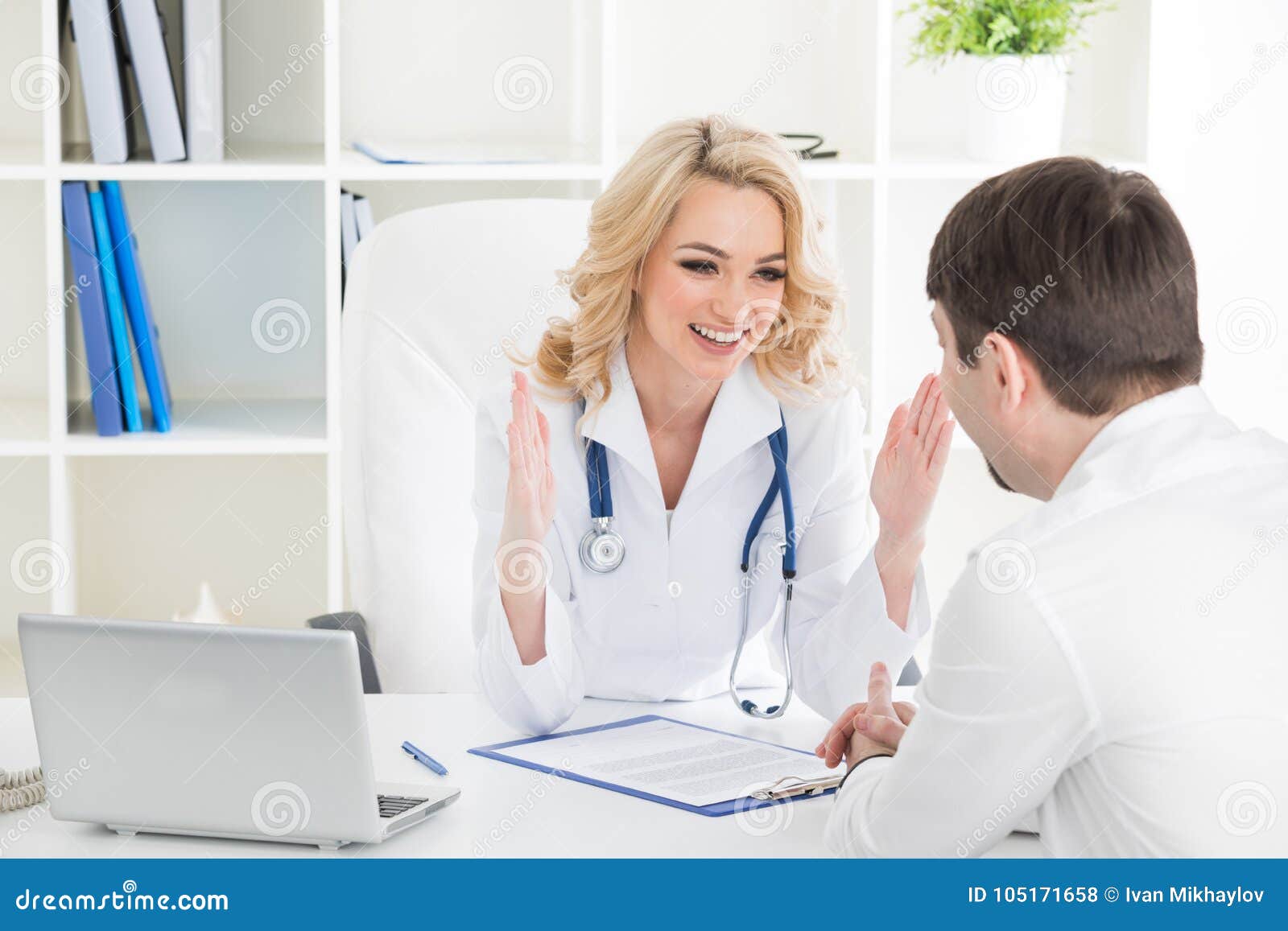 Doctor consulting patient stock photo. Image of diagnose - 105171658 Doctor consulting patient stock photo. Image of diagnose - 105171658