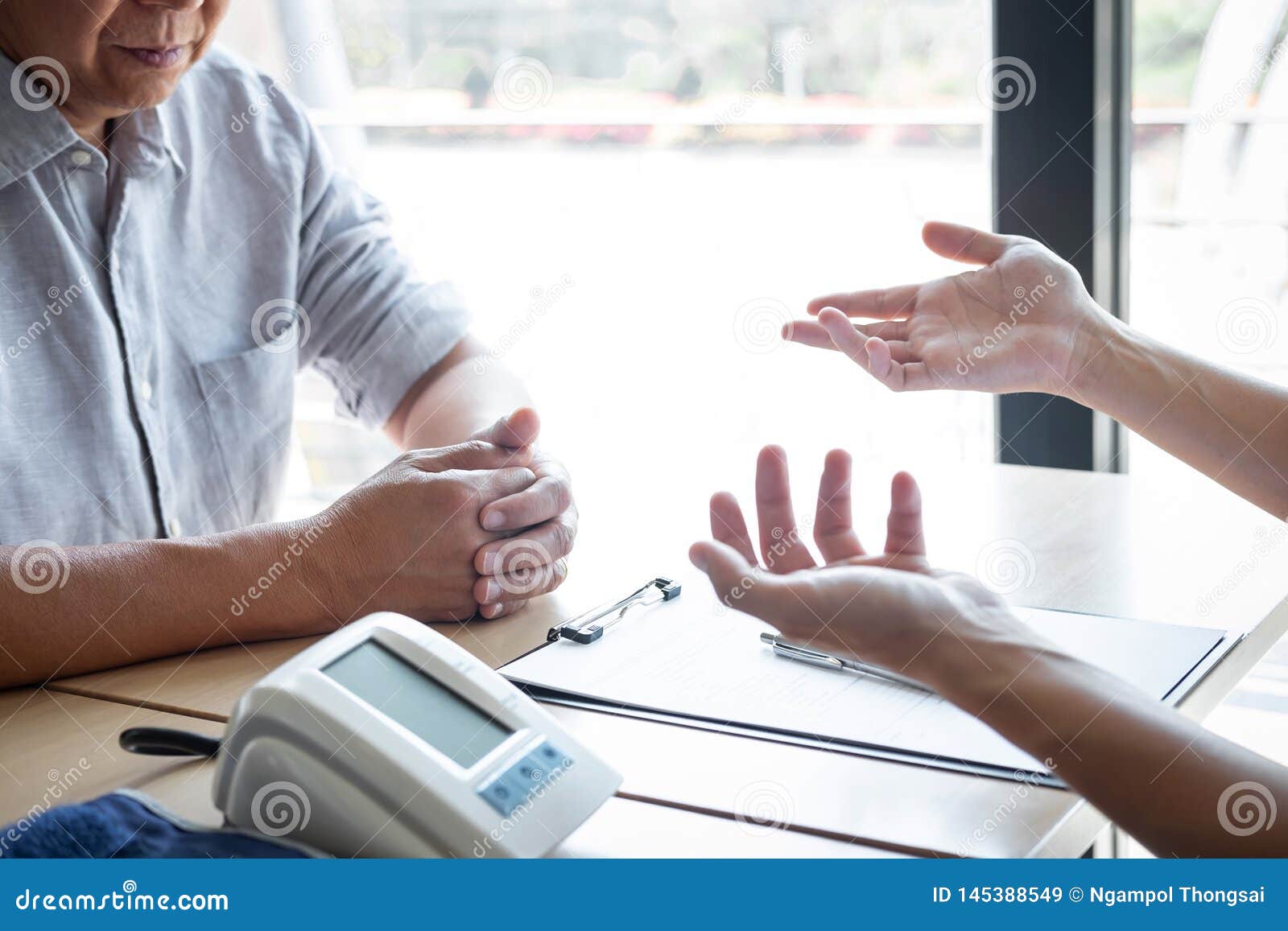 Doctor Consulting with Patient Examining for Patient, Presenting ...