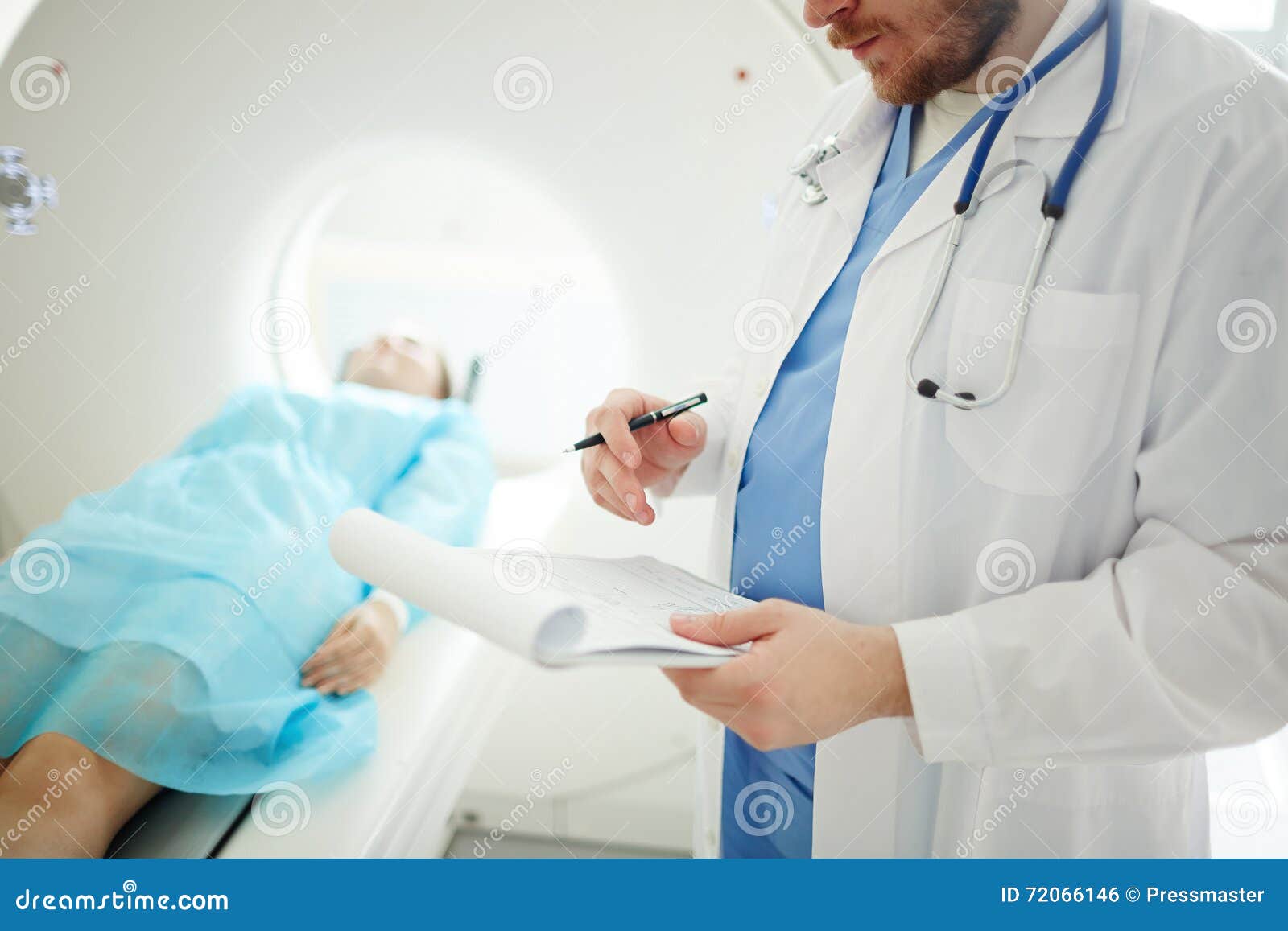 Doctor at CT scan machine stock photo. Image of patient - 72066146