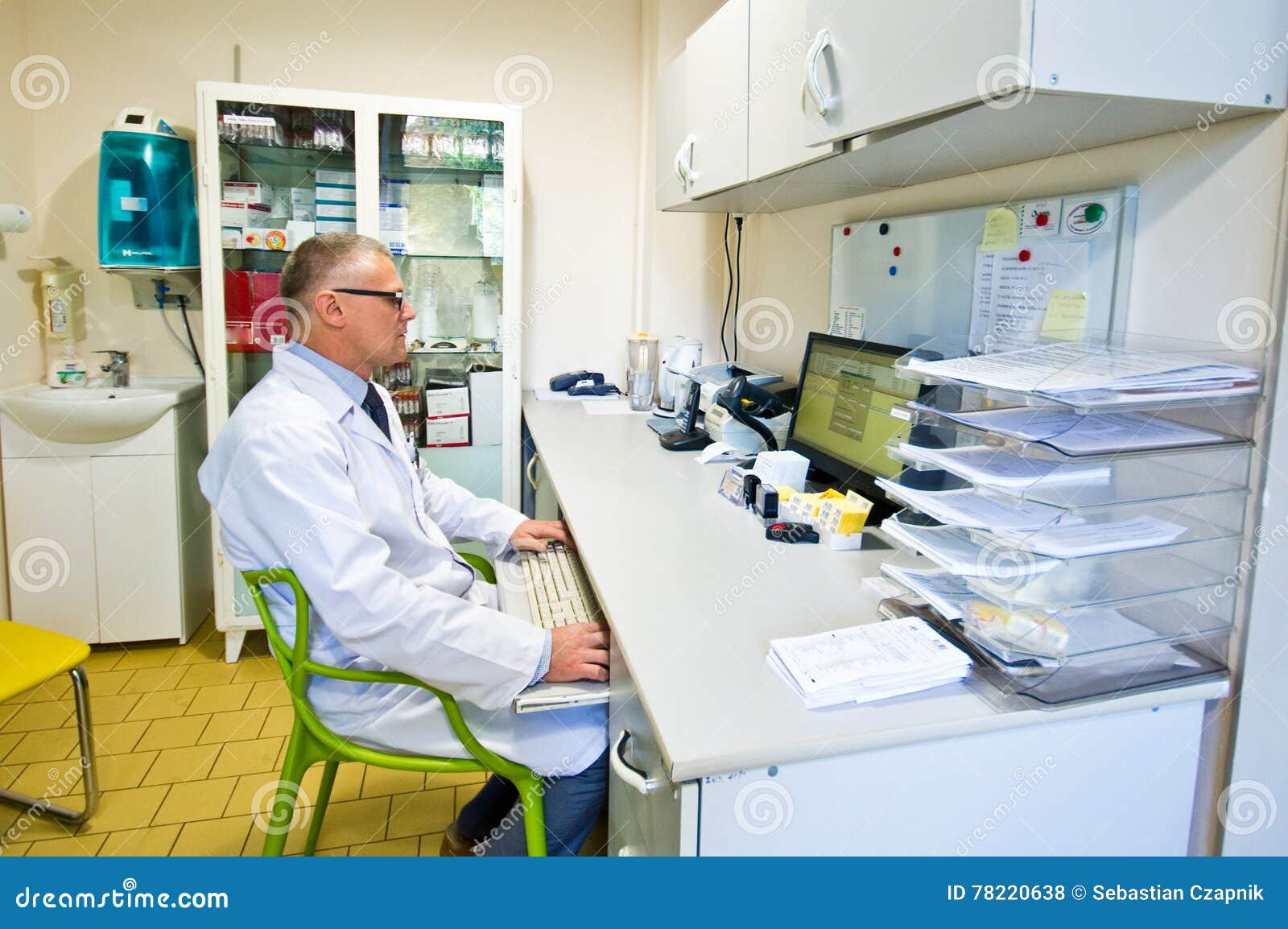 Doctor at desk in lab stock photo. Image of coat, scientist - 78220638