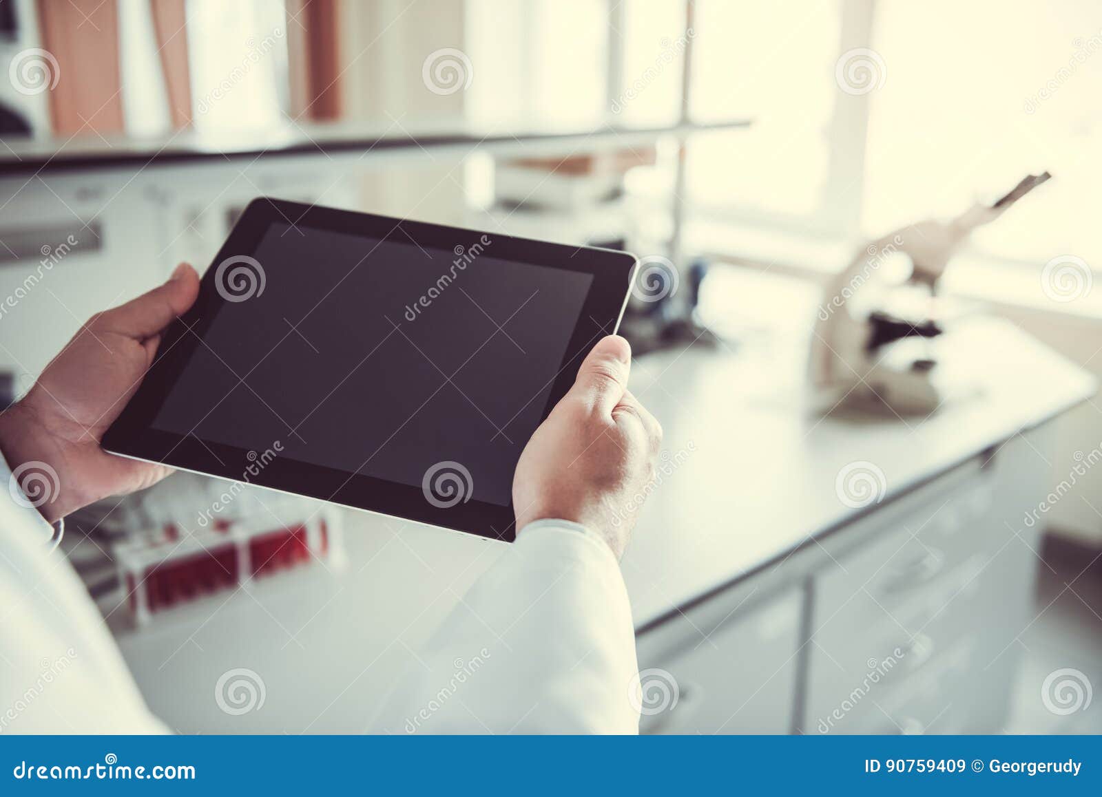 Doctor with digital tablet stock image. Image of handsome - 90759409