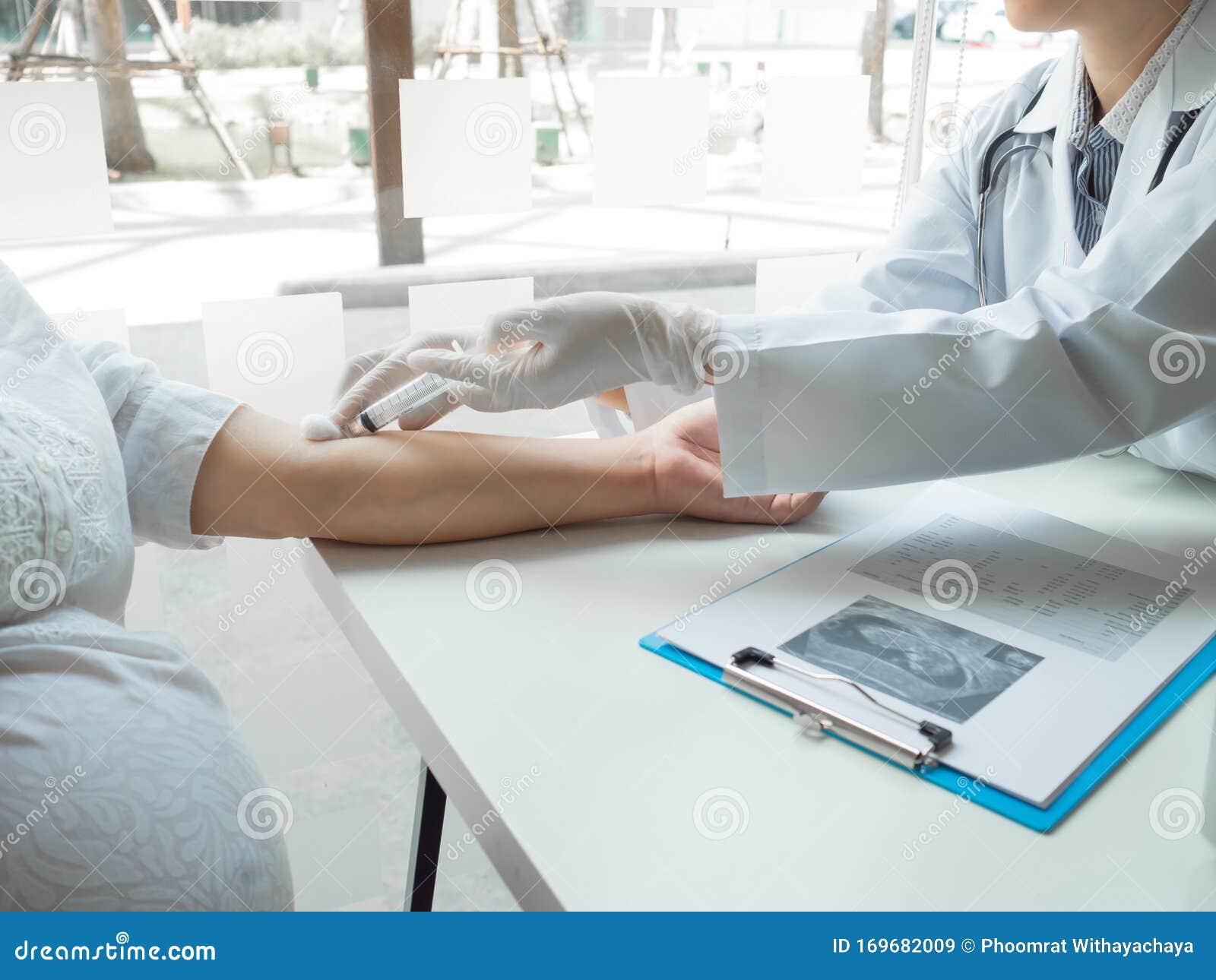 A Doctor is Doing Blood Testing for a Pregnant Patient Stock Image ...