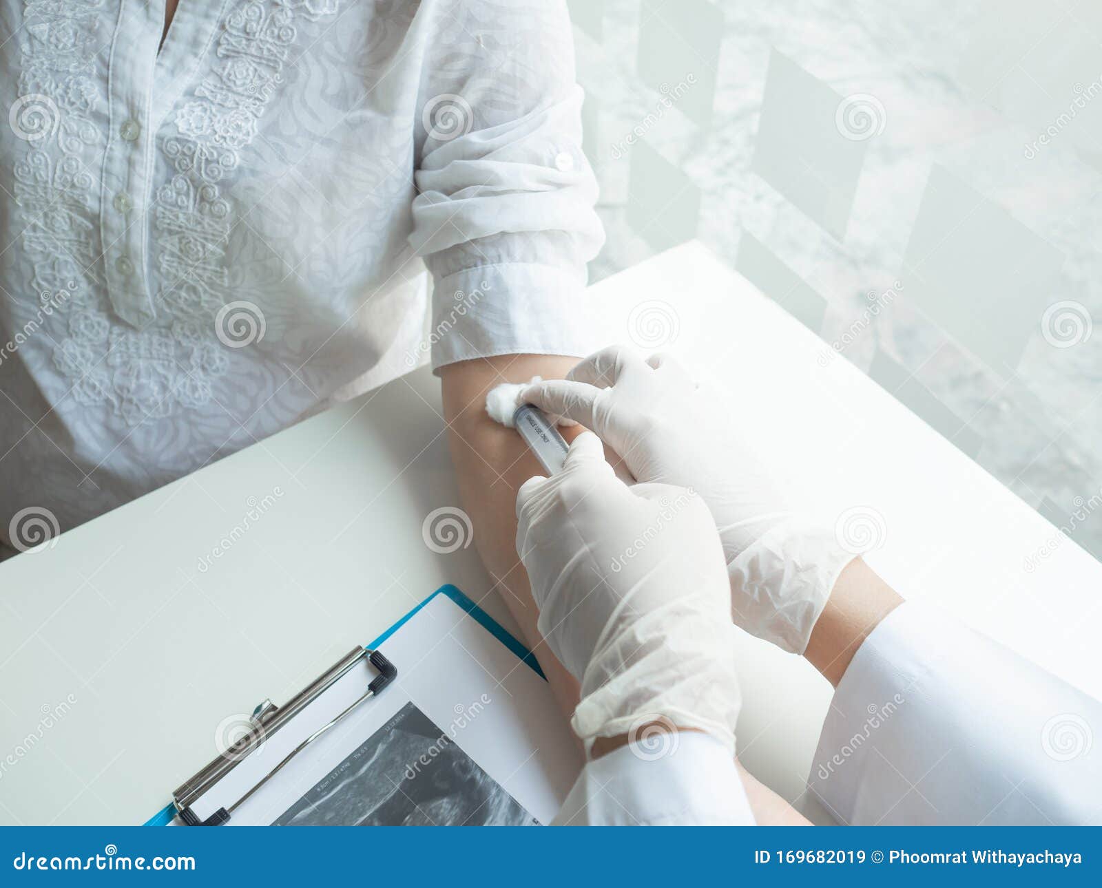 A Doctor is Doing Blood Testing for a Pregnant Patient Stock Image ...