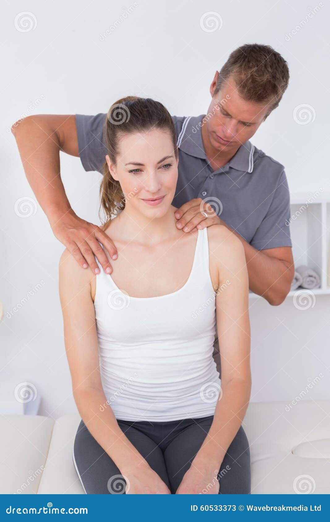 Doctor Doing Neck Adjustment Stock Image - Image of male, mature: 60533373
