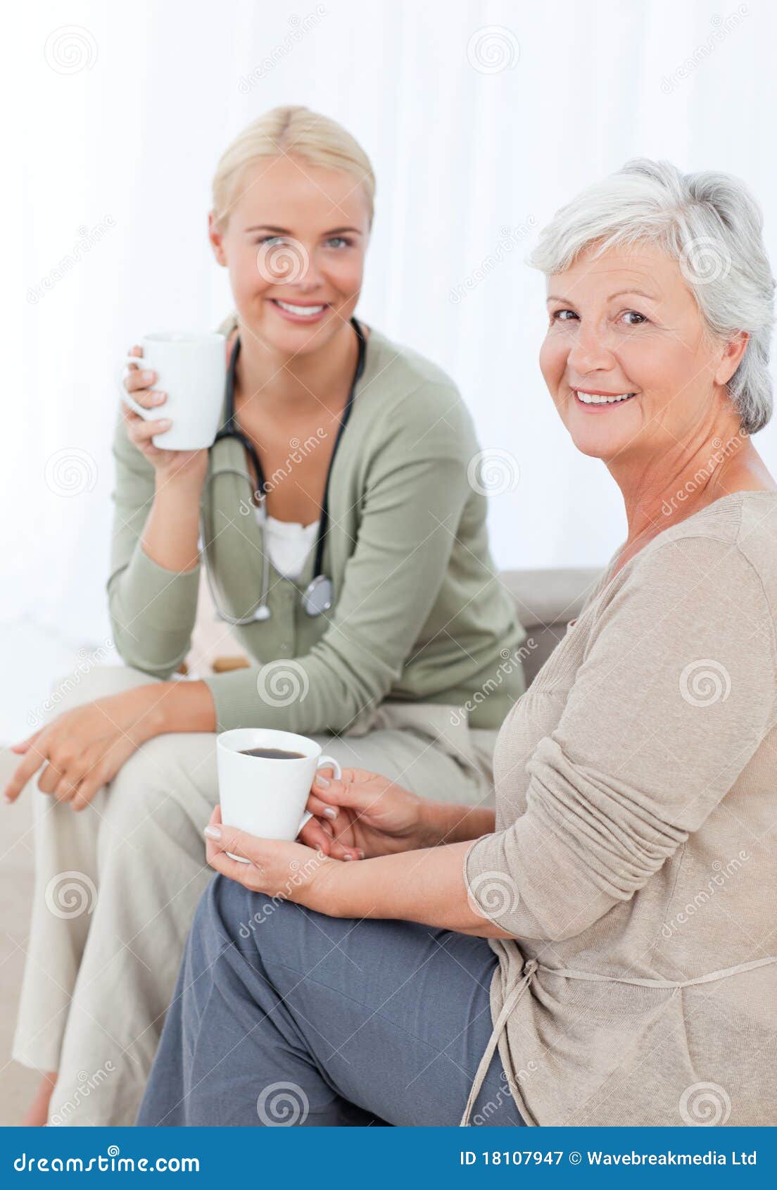 Doctor Drinking with Her Patient Stock Image - Image of practitioner ...