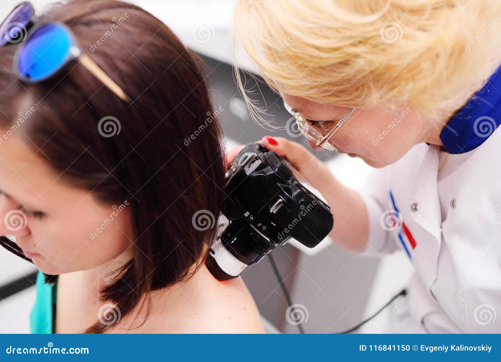 The Doctor Examines the Patient`s Mole Stock Photo - Image of device ...