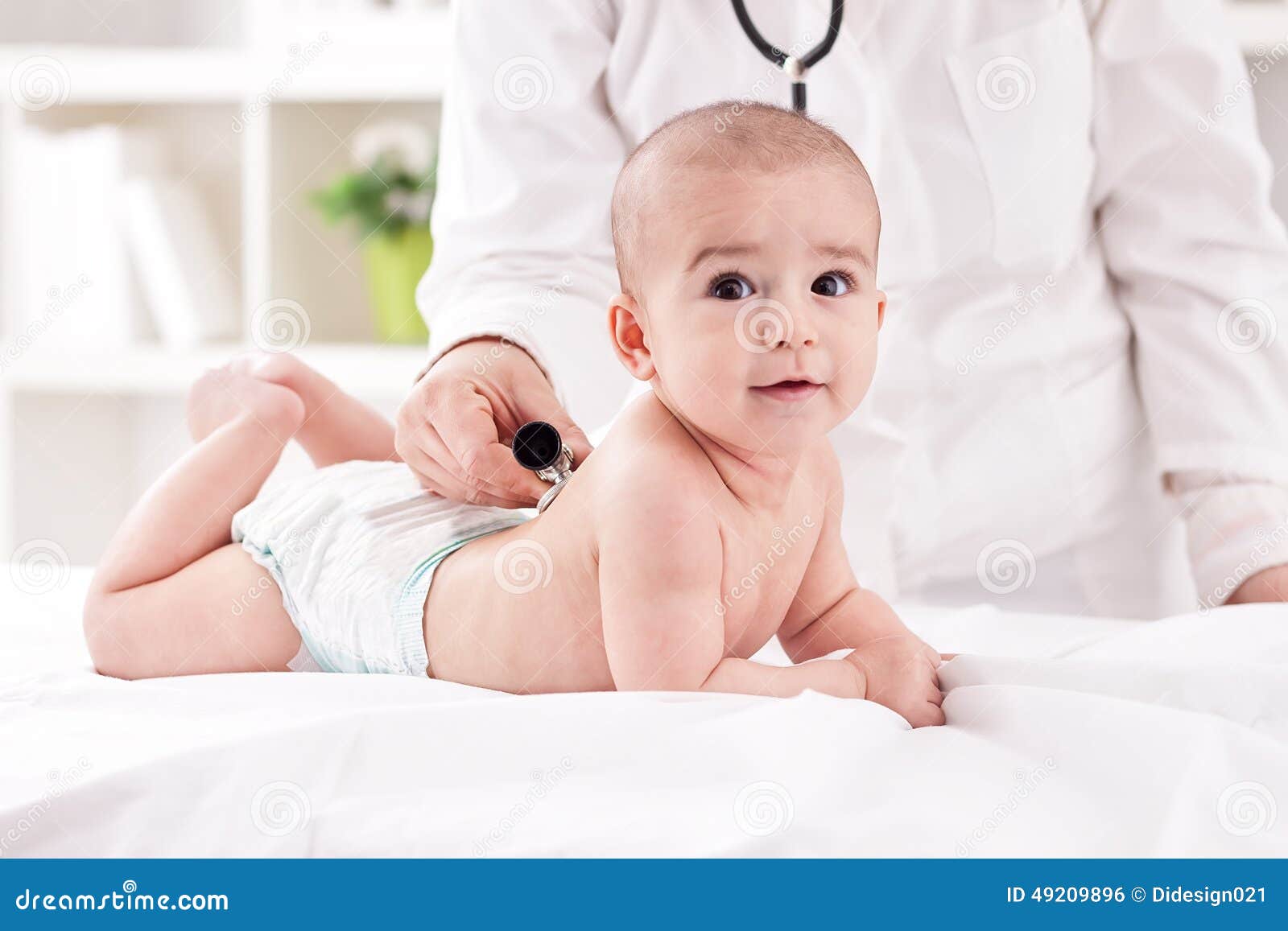 The Doctor Examining Baby with Stethoscope Stock Photo - Image of ...
