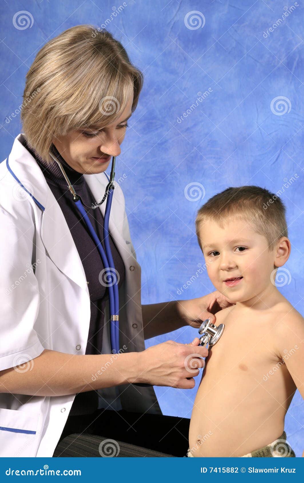 Doctor examining child stock photo. Image of stethoscope - 7415882