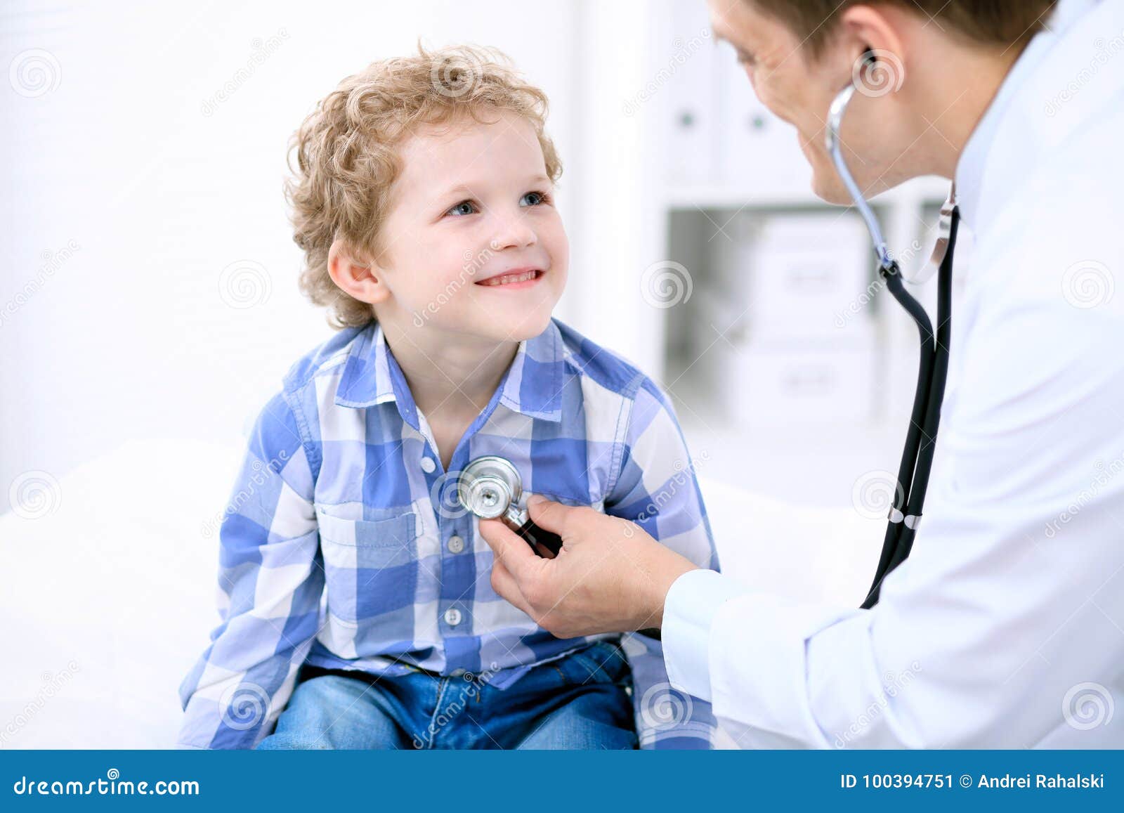 Doctor Examining a Child Patient by Stethoscope Stock Image - Image of ...