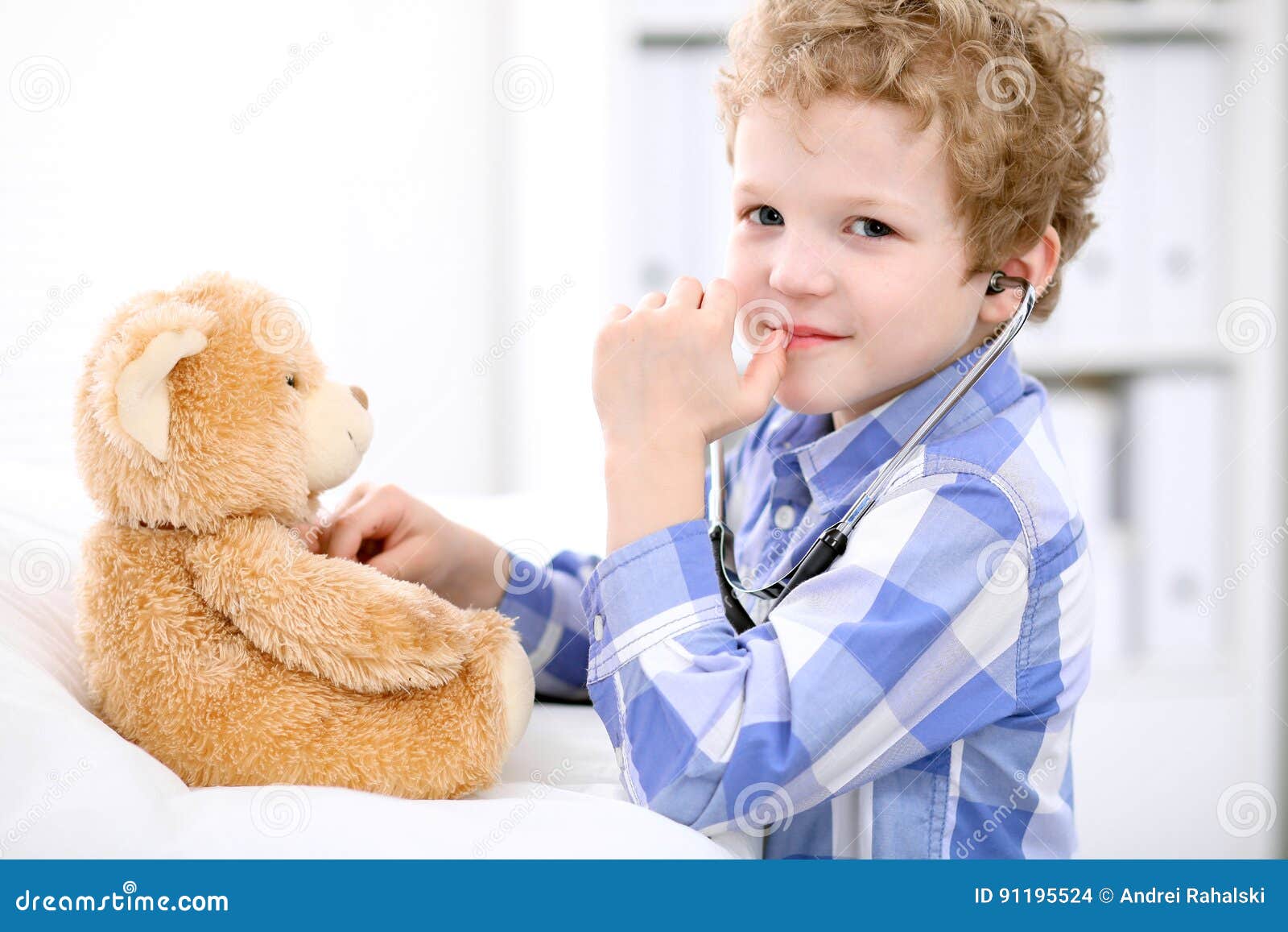 Doctor Examining a Child Patient by Stethoscope Stock Photo - Image of ...