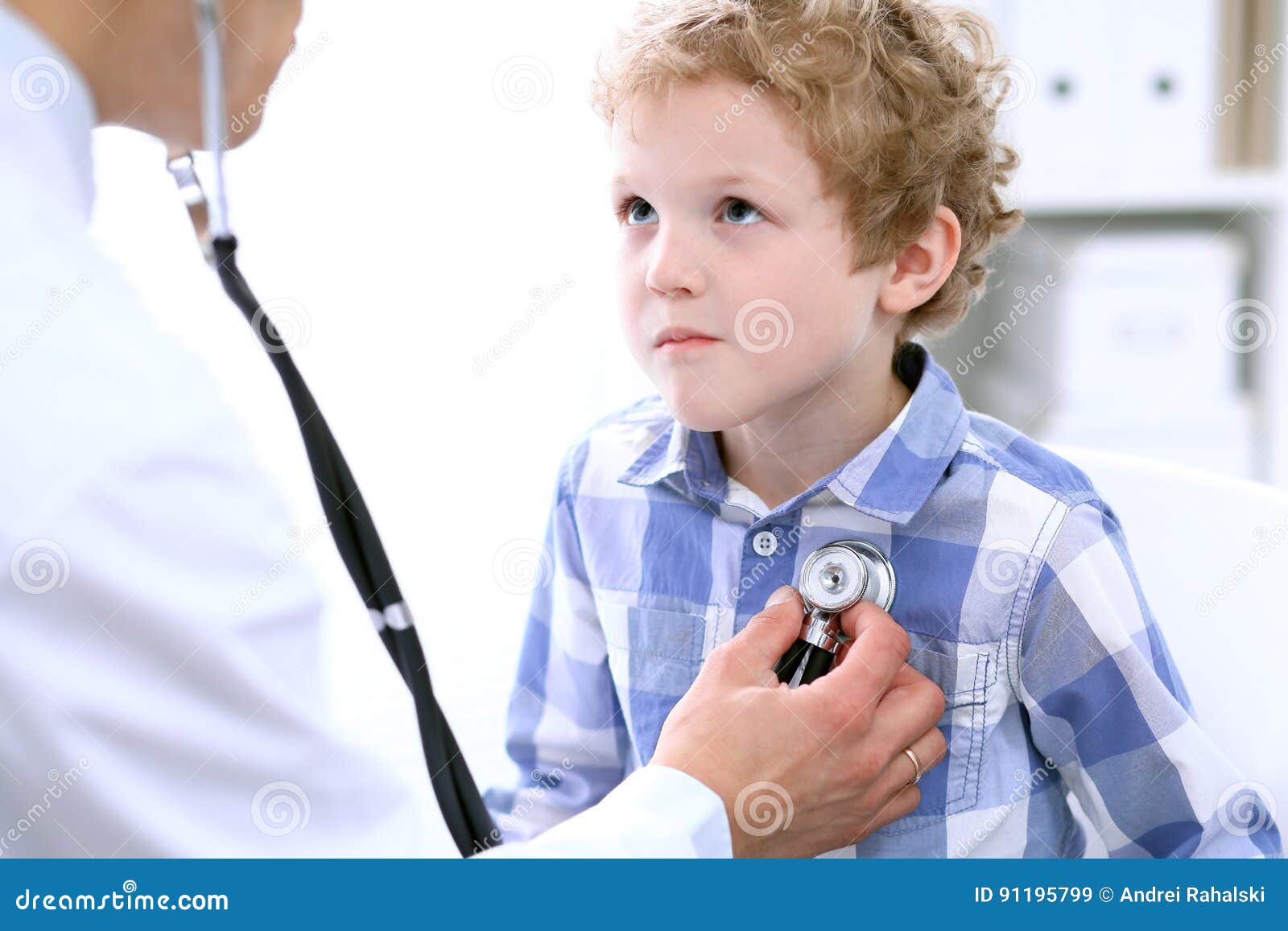 Doctor Examining a Child Patient by Stethoscope Stock Image - Image of ...