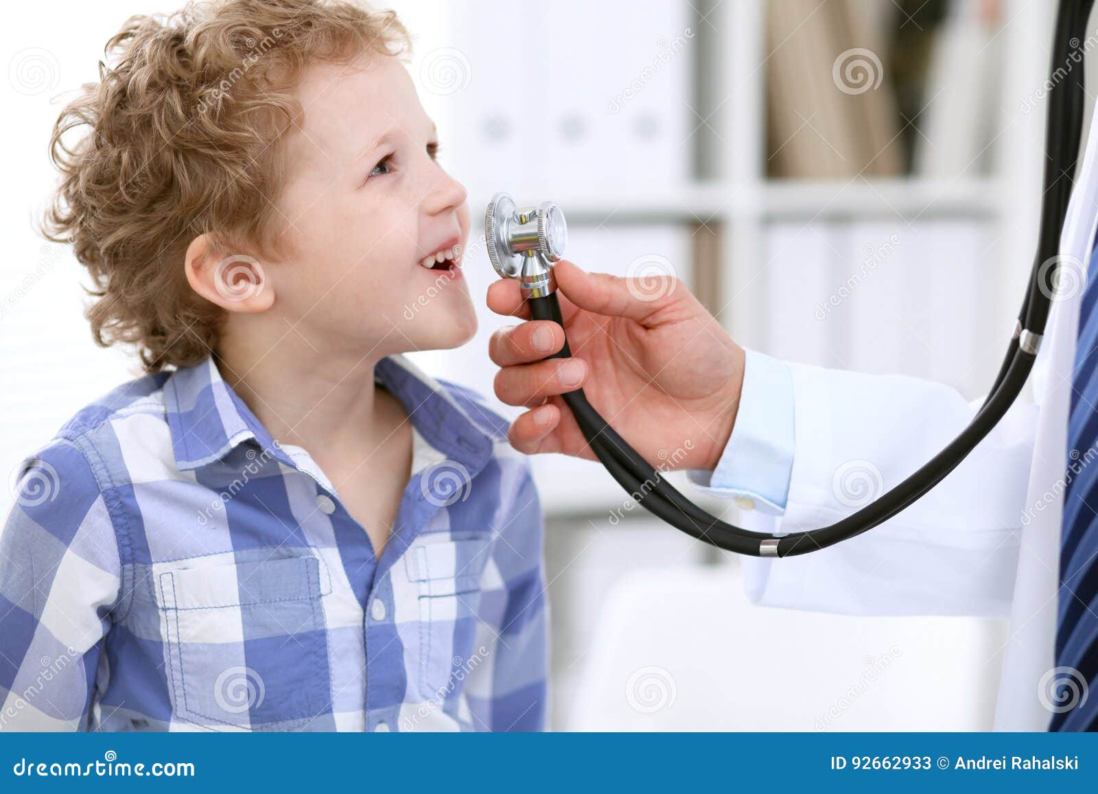 Doctor Examining a Child Patient by Stethoscope Stock Image - Image of ...