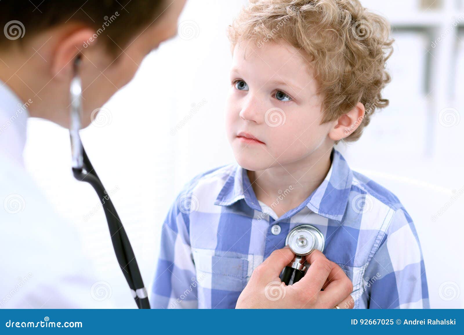 Doctor Examining a Child Patient by Stethoscope Stock Image - Image of ...