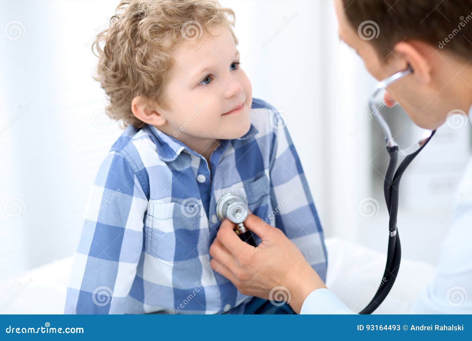 Doctor Examining a Child Patient by Stethoscope Stock Image - Image of ...