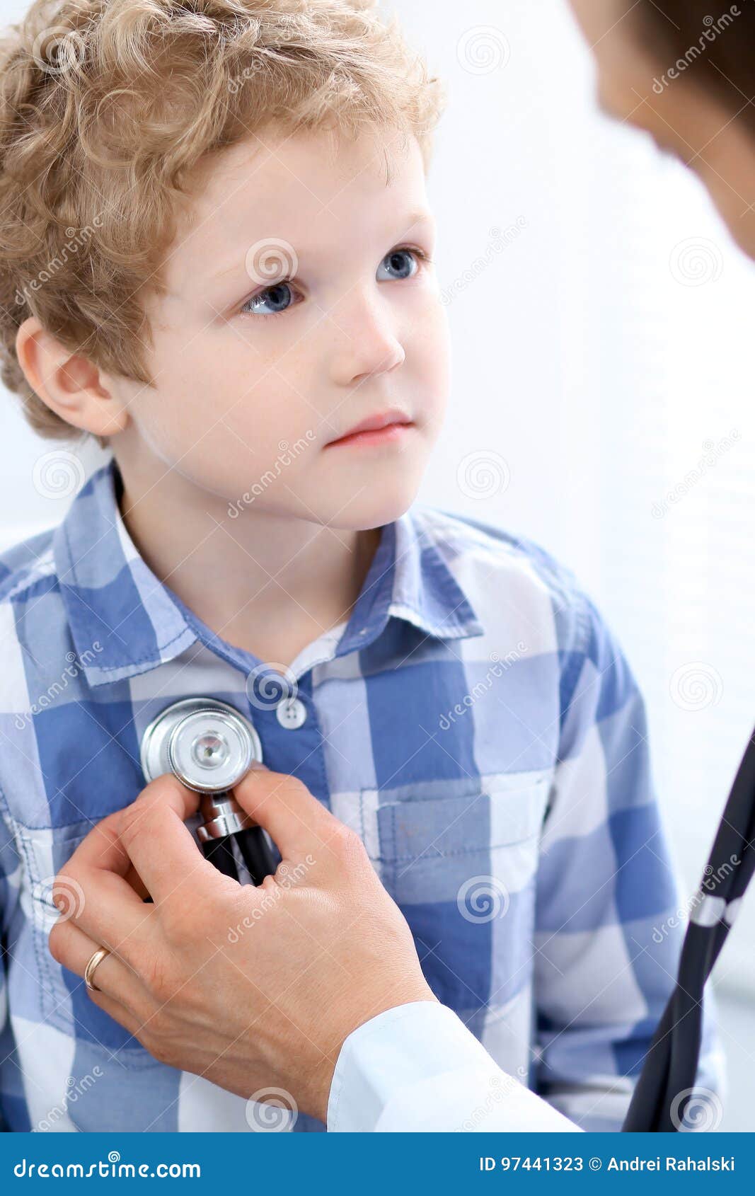 Doctor Examining a Child Patient by Stethoscope Stock Image - Image of ...