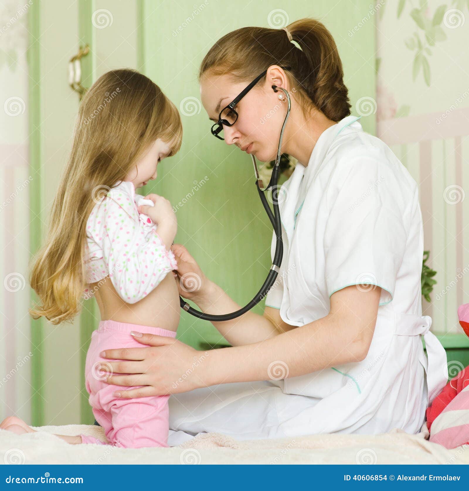 Doctor examining girl stock photo. Image of medic, illness - 40606854