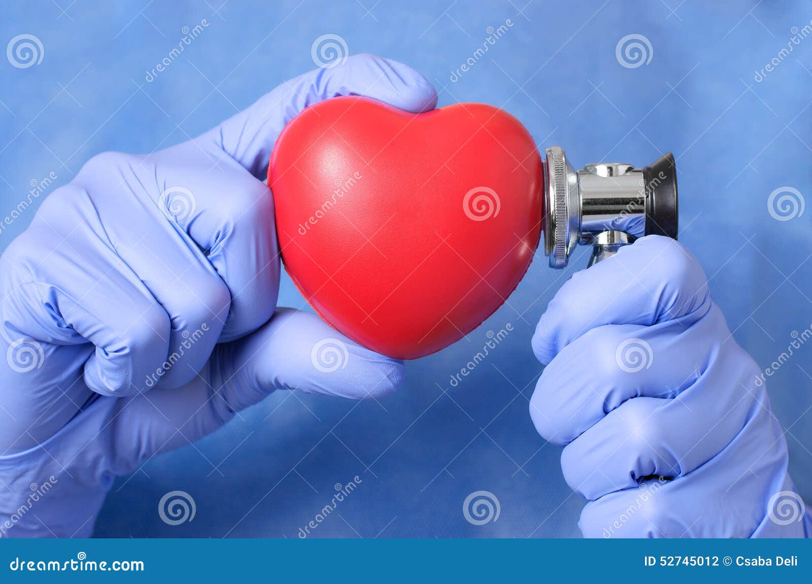 Doctor examining a heart stock photo. Image of check - 52745012