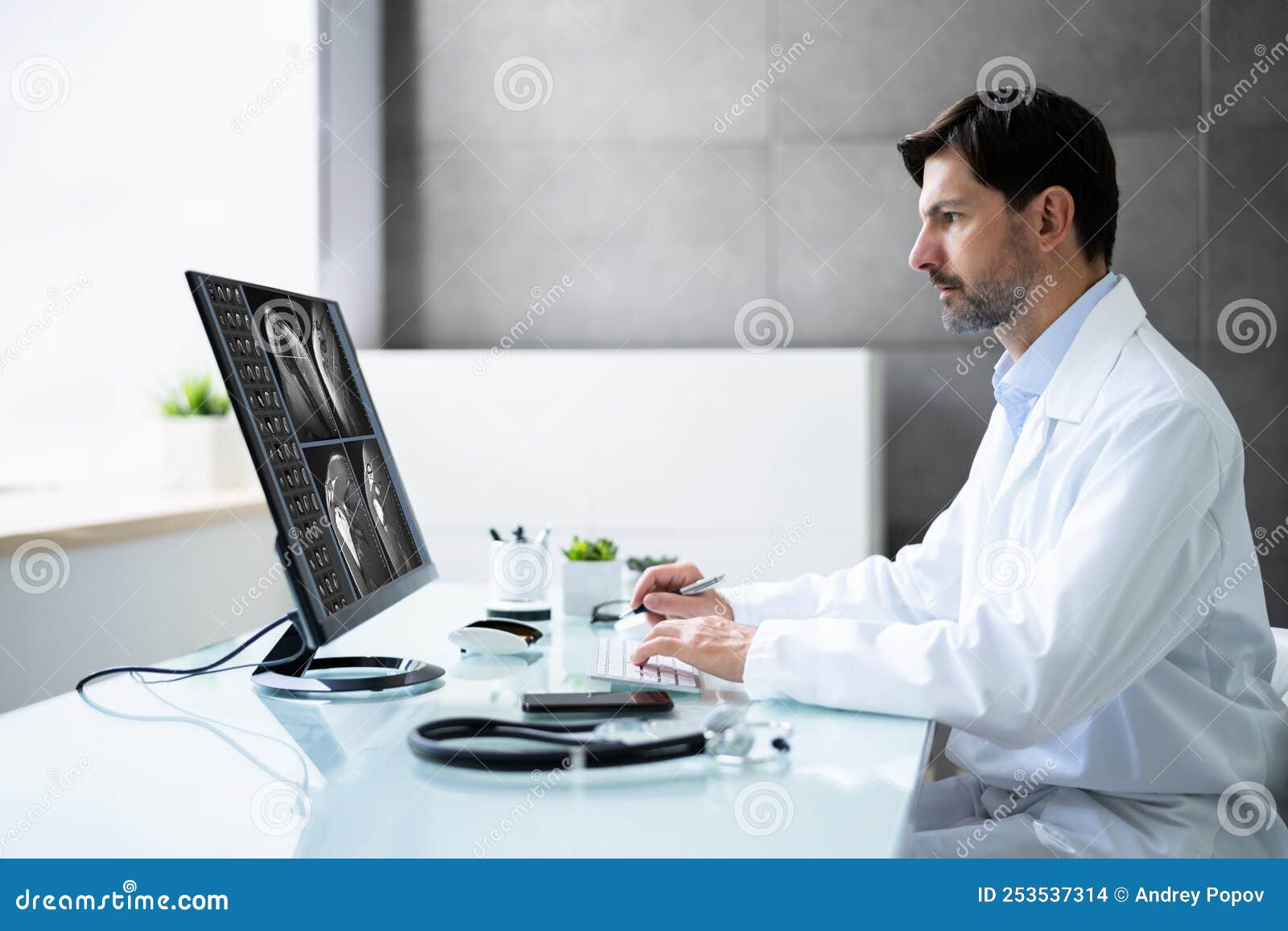 Doctor Examining MRT Image. Medical Student Stock Photo - Image of male ...