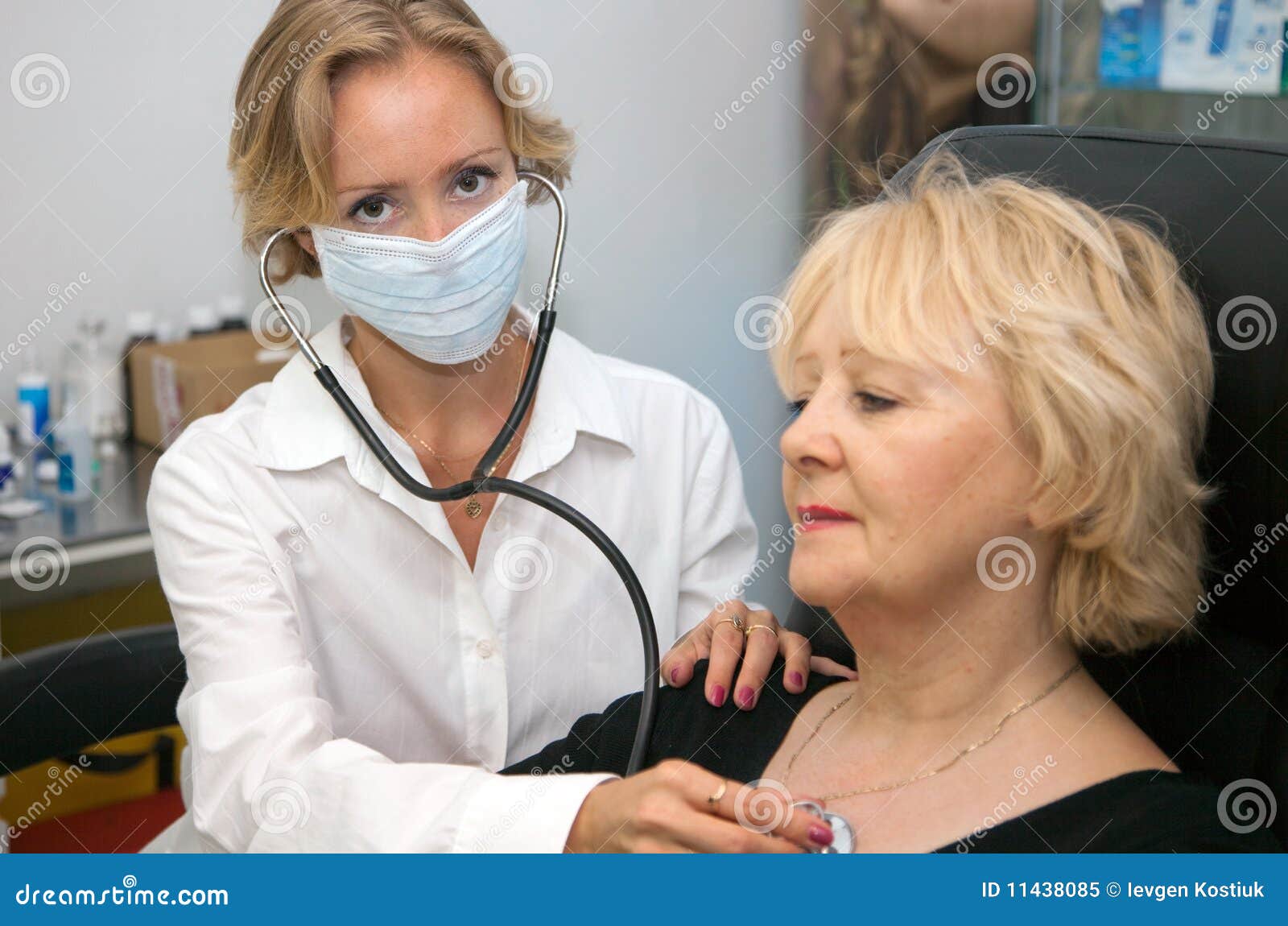 Doctor, examining patient stock image. Image of nurse - 11438085
