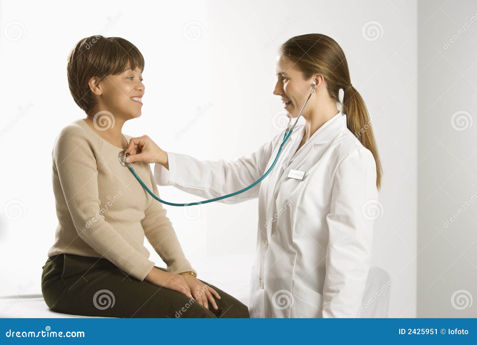 Doctor examining patient. stock image. Image of women - 2425951