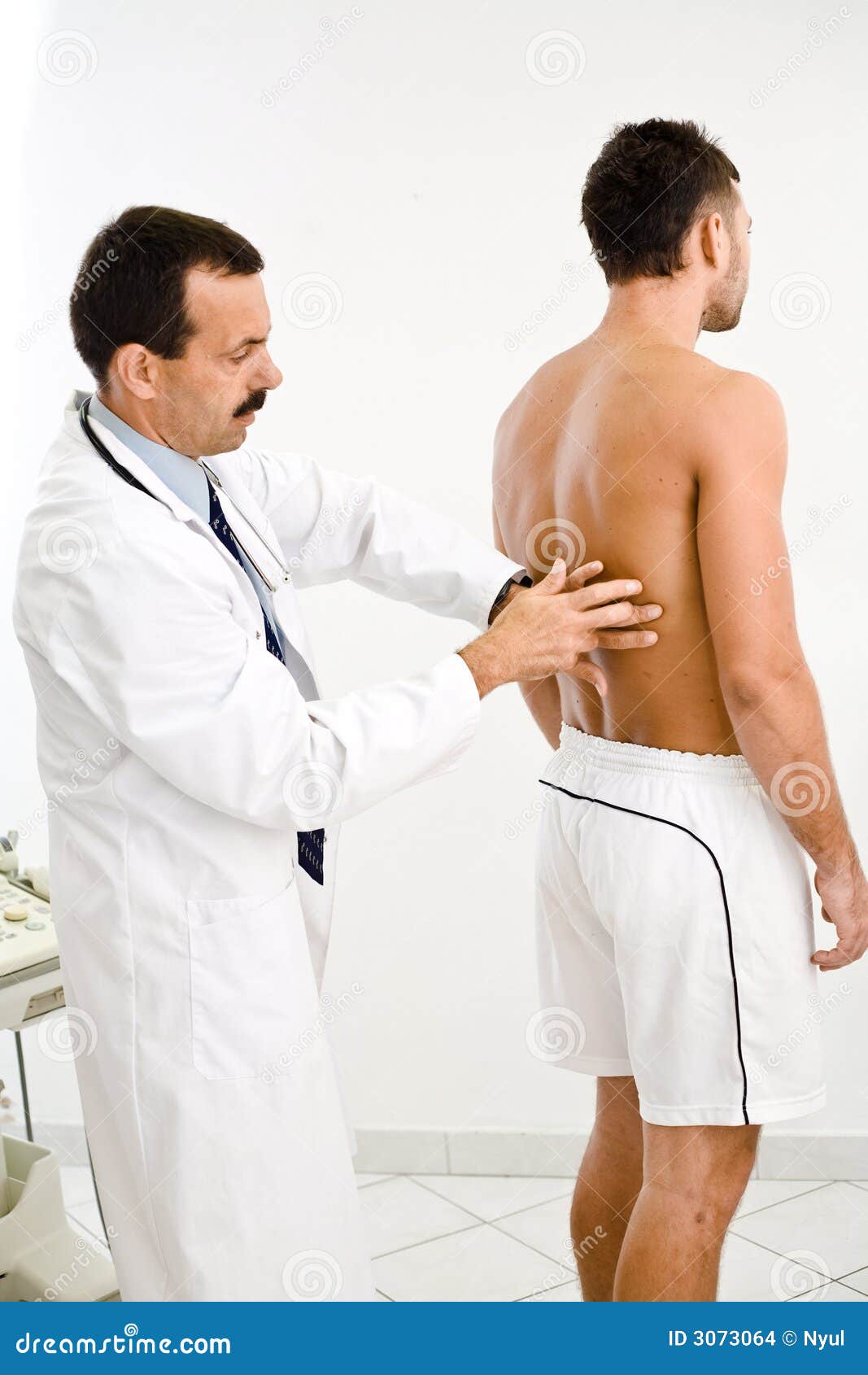 Doctor examining patient stock photo. Image of practitioner - 3073064