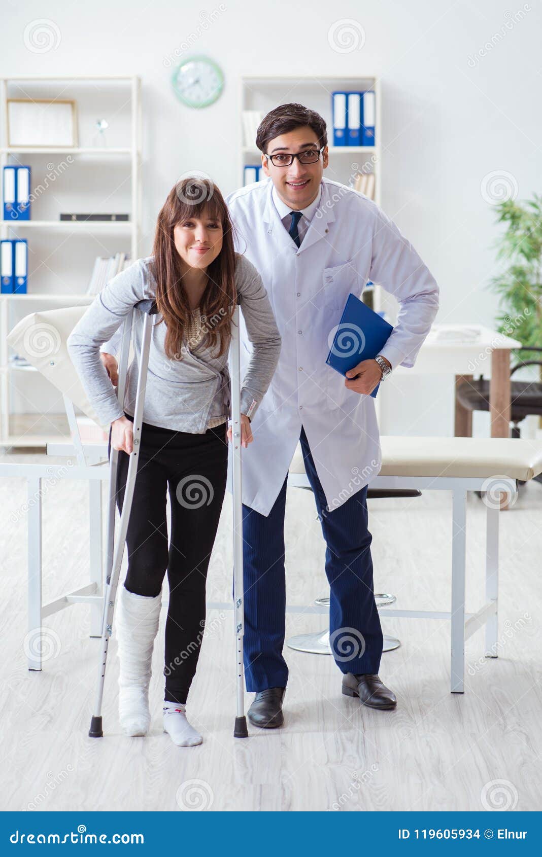 The Doctor Examining Patient with Broken Leg Stock Photo - Image of ...