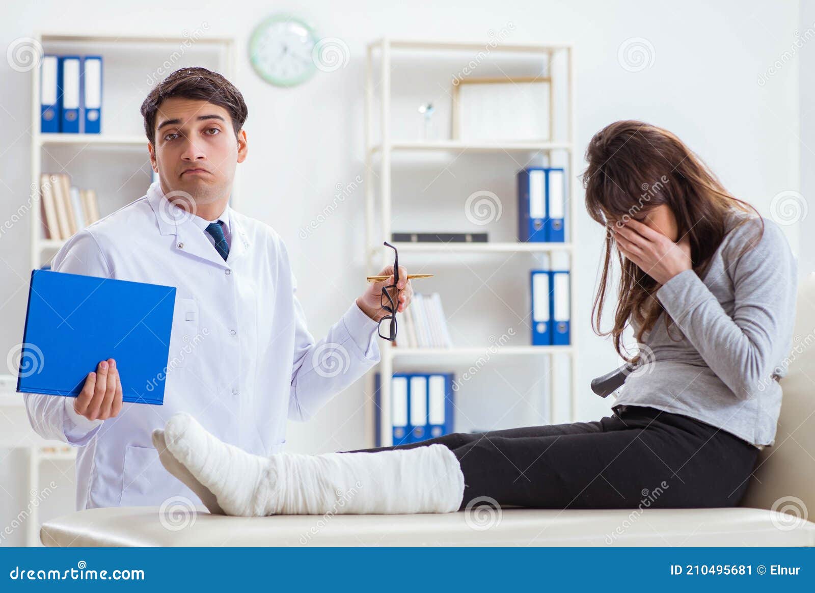 Doctor Examining Patient with Broken Leg Stock Image - Image of bandage ...