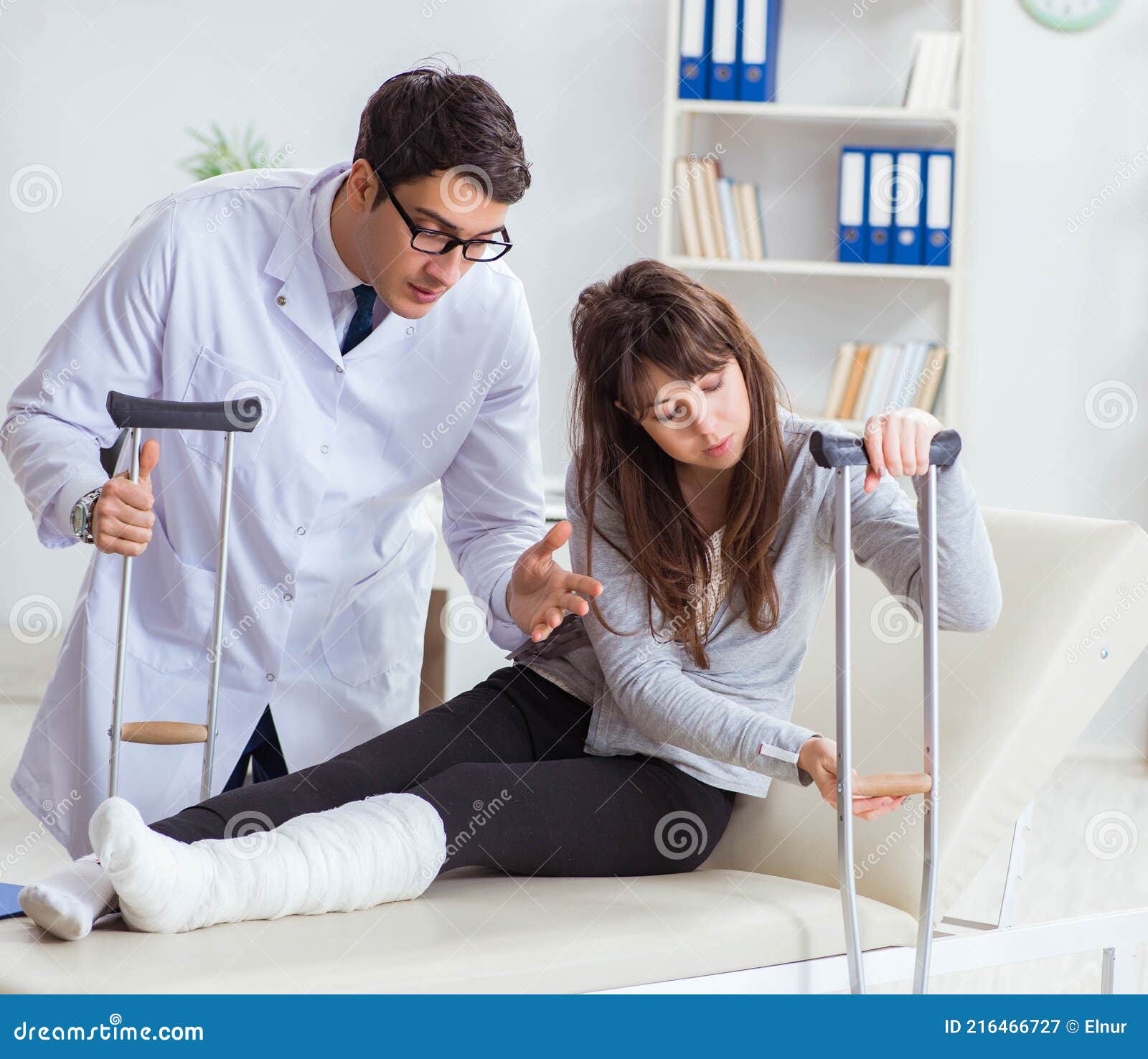 Doctor Examining Patient with Broken Leg Stock Image - Image of ...