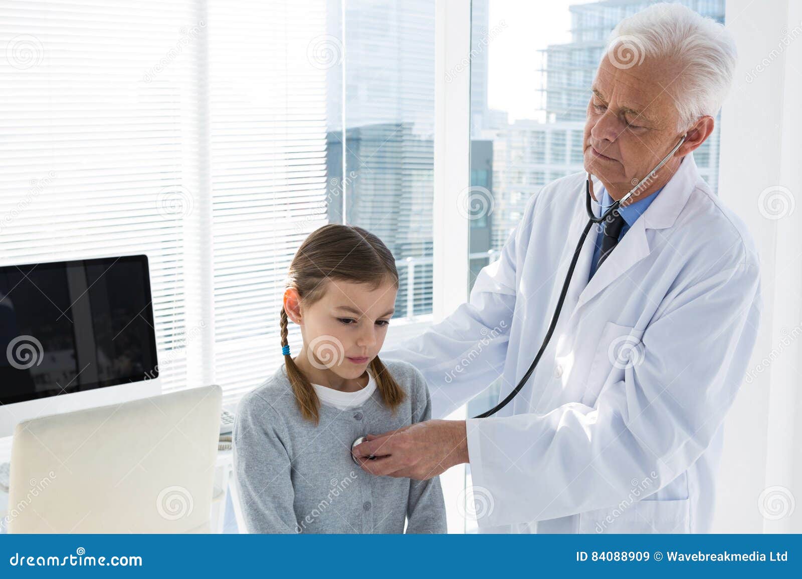 Doctor examining a patient stock image. Image of mature - 84088909