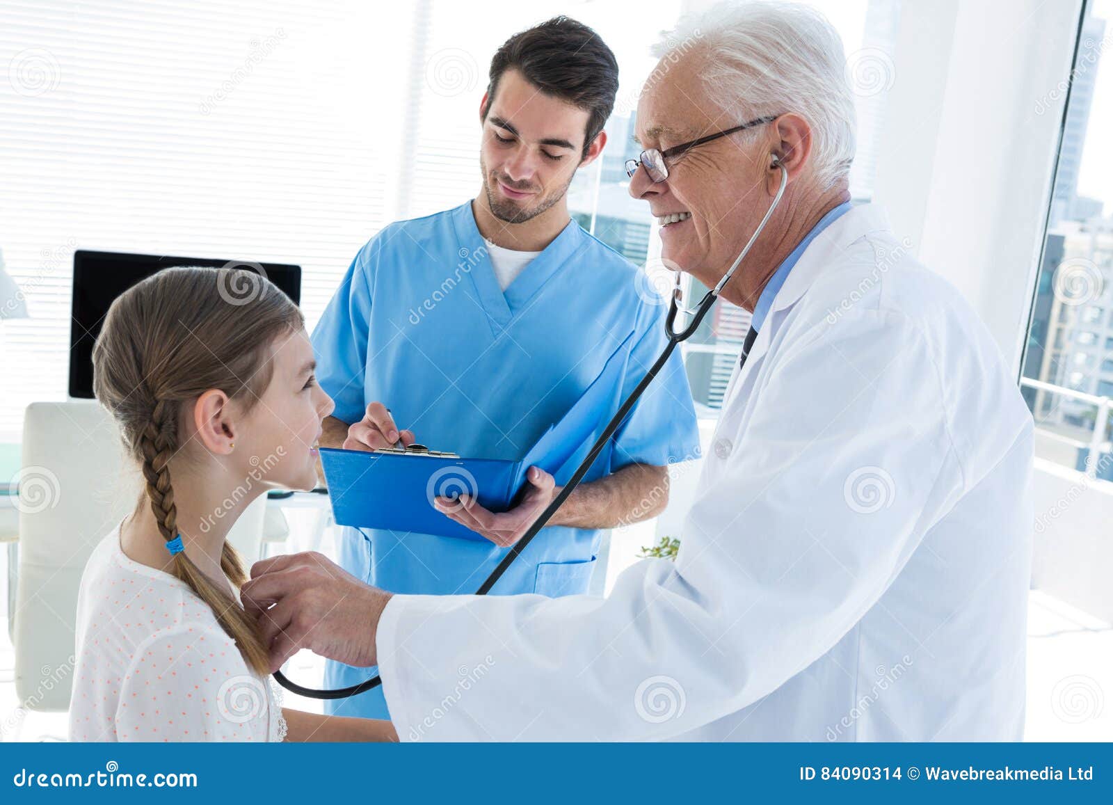 Doctor examining a patient stock photo. Image of checkup - 84090314
