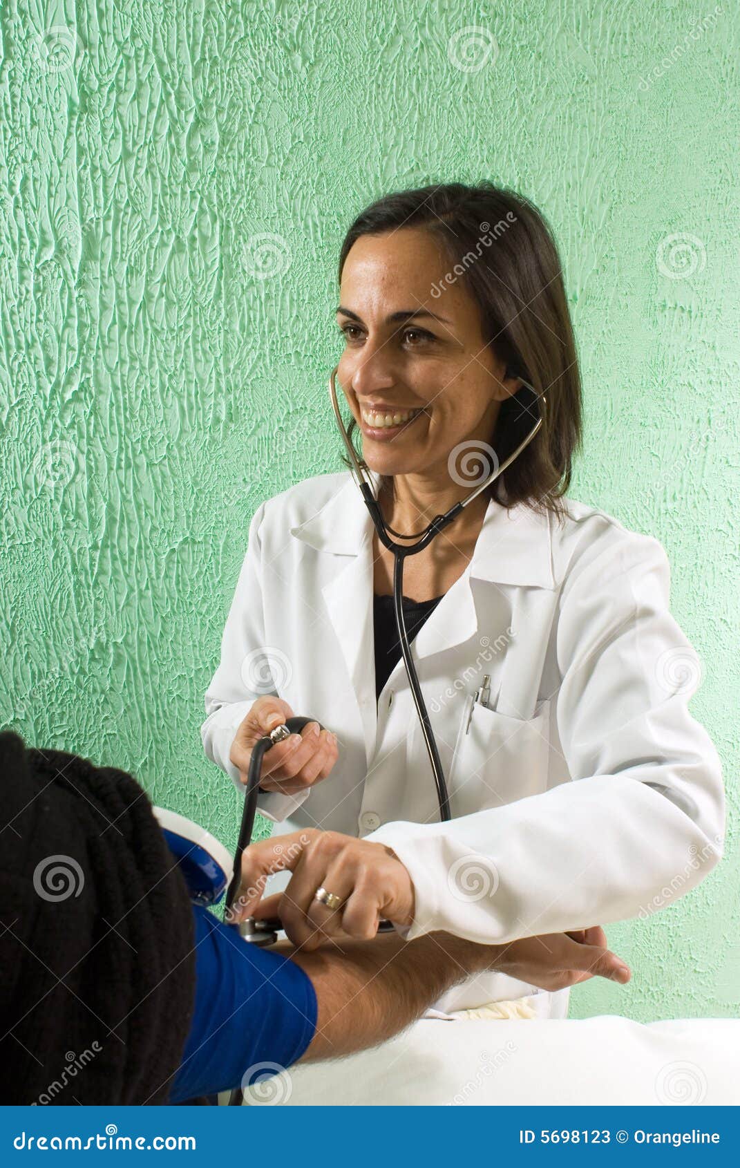 Doctor Examining Patient in Office - Vertical Stock Image - Image of ...
