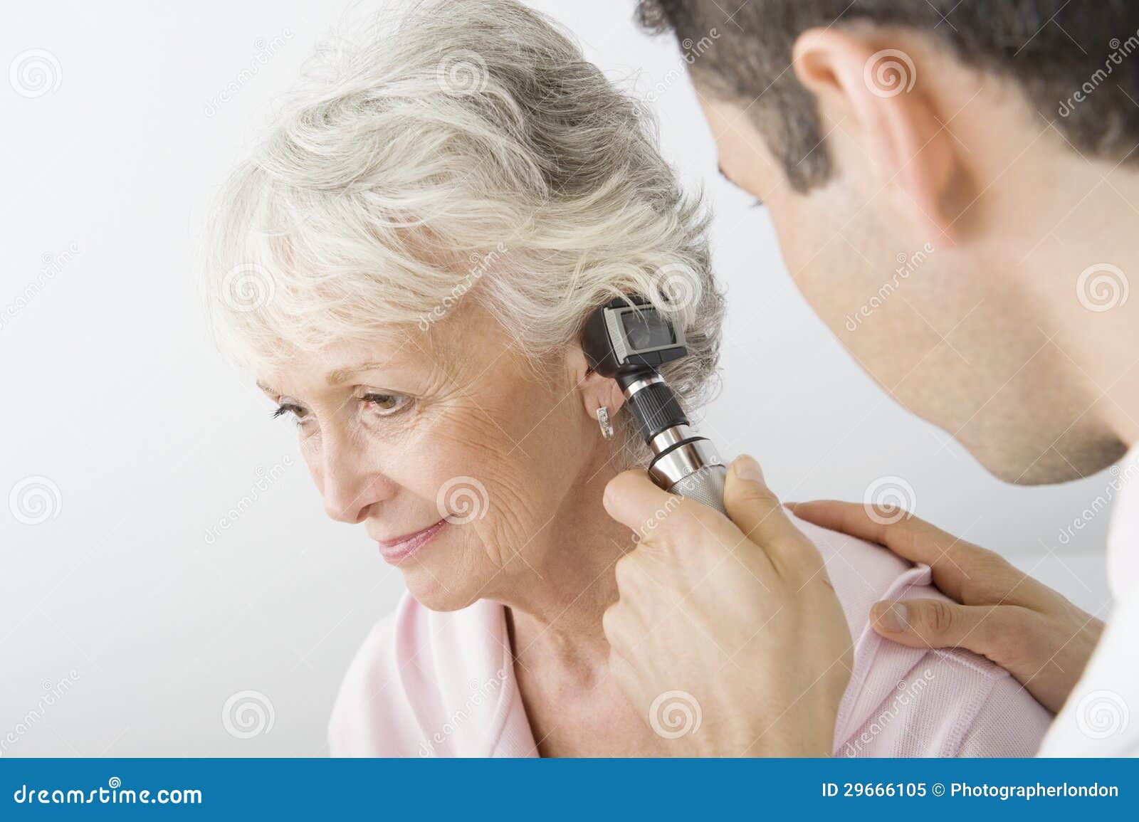 Doctor Examining Patient S Ear Using Otoscope Stock Image - Image of ...