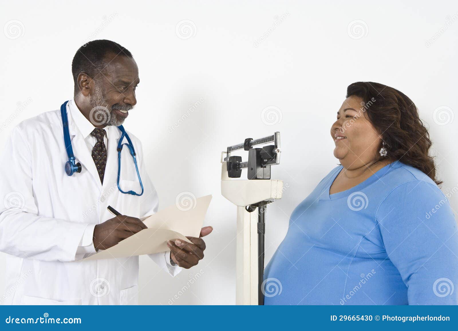 Doctor Examining Patient S Weight Stock Photo - Image of mature ...