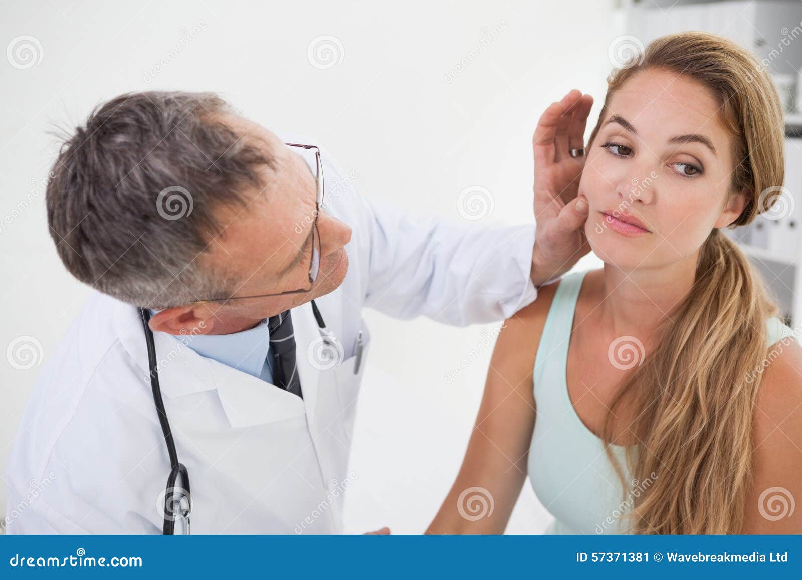 Doctor Examining Patients Face Stock Image - Image of check, healing ...