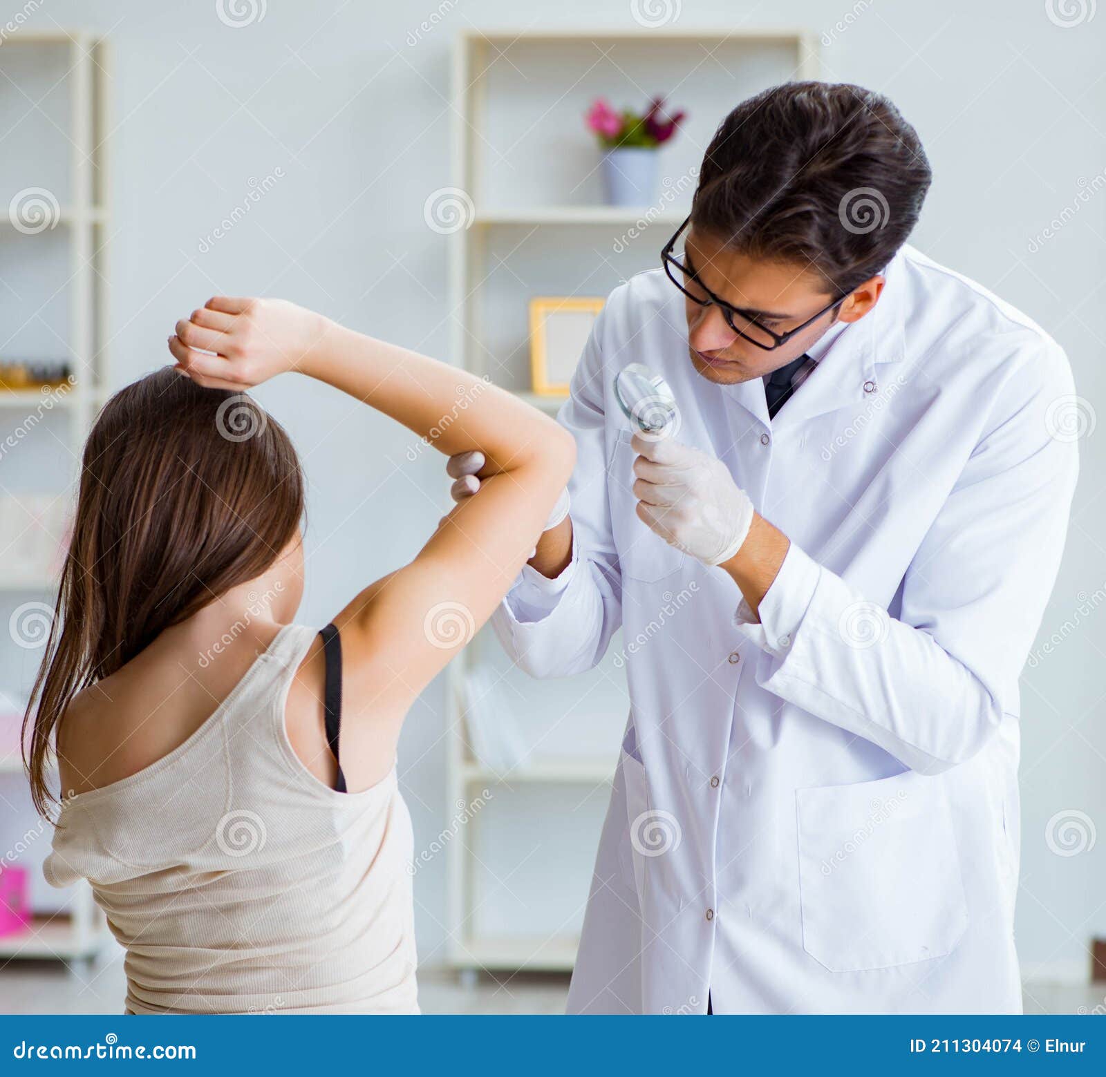 Doctor Examining the Skin of Female Patient Stock Photo - Image of ... Doctor Examining the Skin of Female Patient Stock Photo - Image of ...