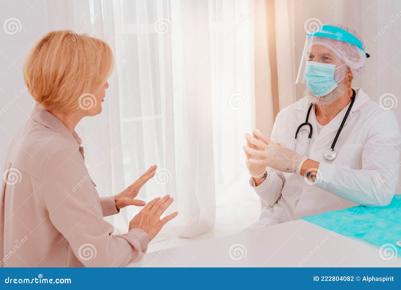 Doctor Explain To the Patient Information about Covid-19 Virus Stock ...