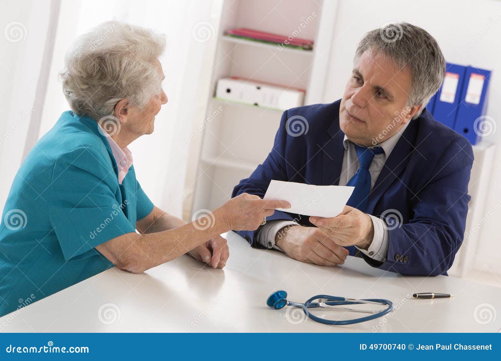 Doctor Explaining Diagnosis To His Patient Stock Photo - Image of exam ...