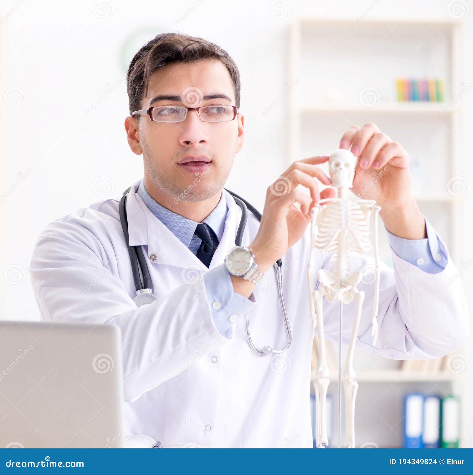 Doctor Explaining Human Body on Skeleton Stock Photo - Image of clinic ...