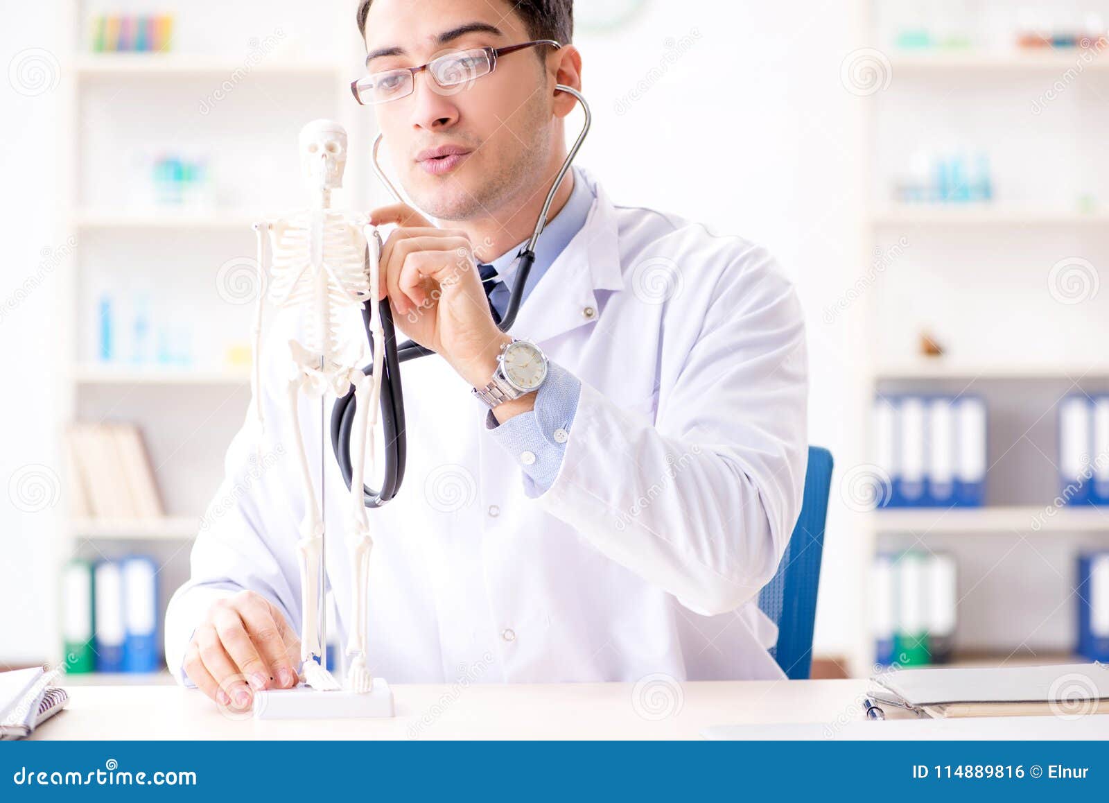 The Doctor Explaining Human Body on Skeleton Stock Photo - Image of ...