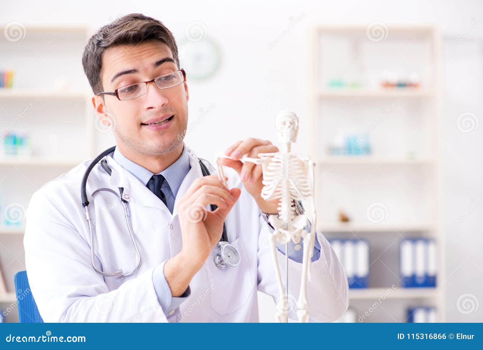The Doctor Explaining Human Body on Skeleton Stock Photo - Image of ...