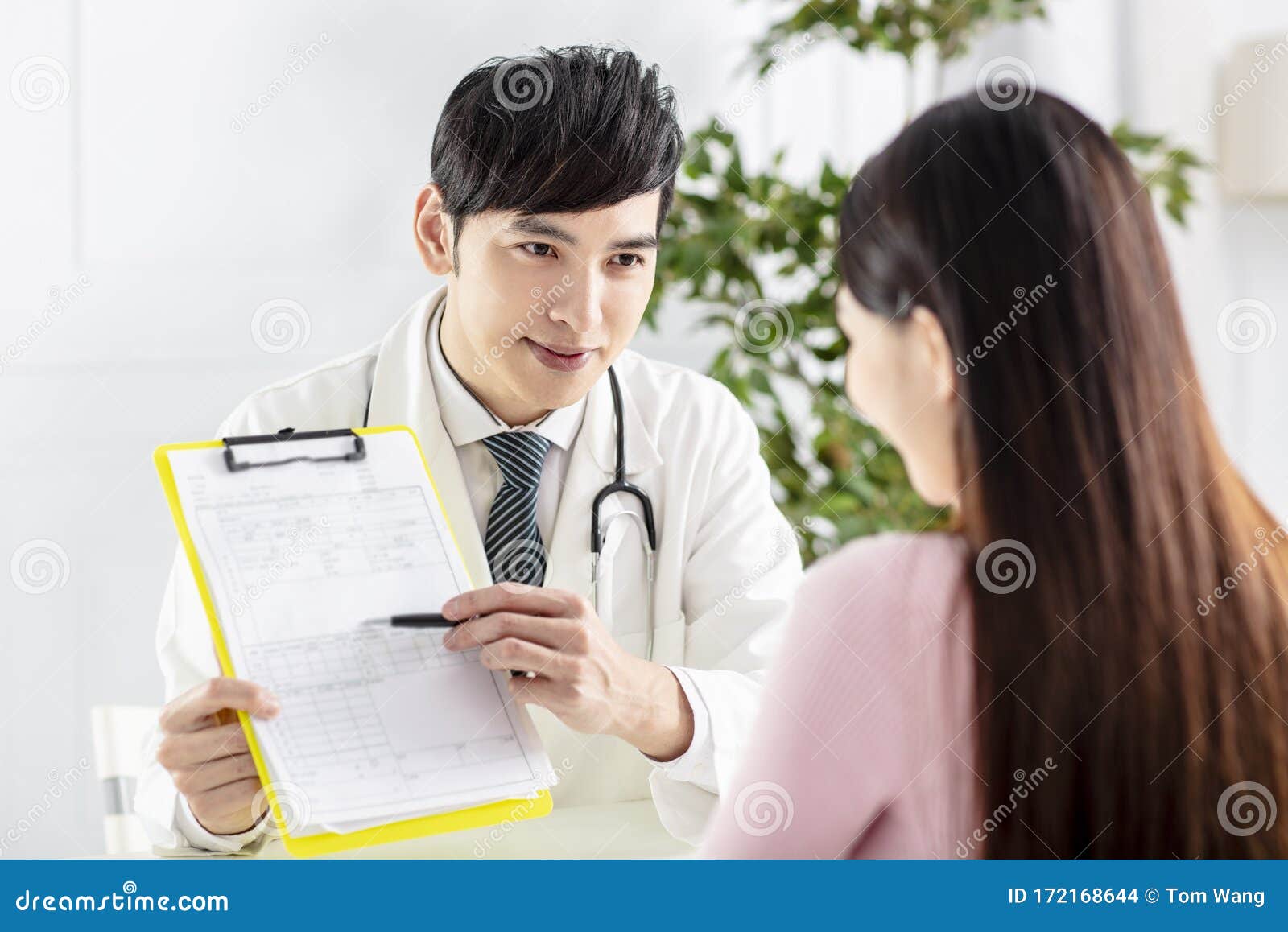 Doctor Explaining Medical Reports To His Patient Stock Photo - Image of ...