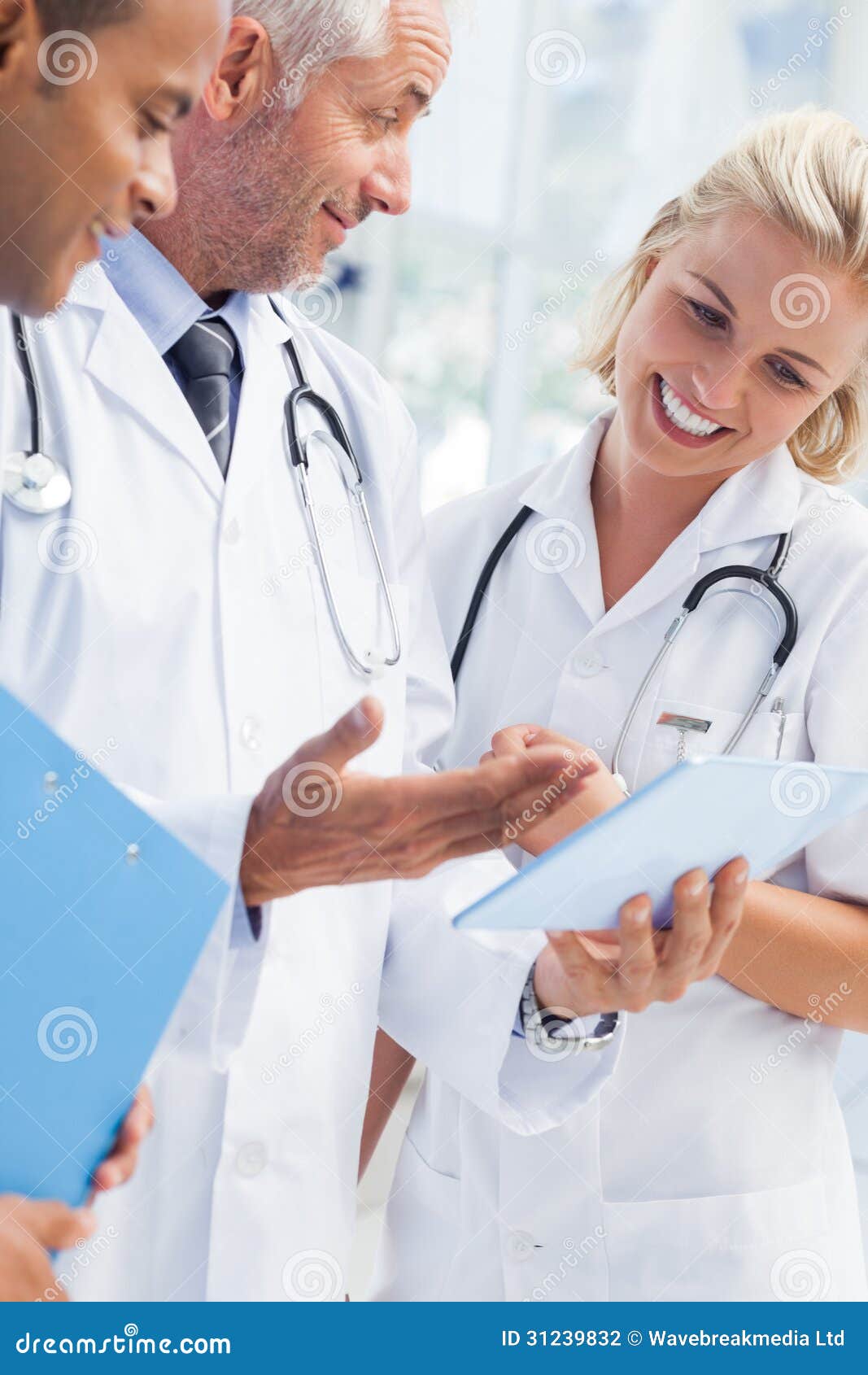 Doctor Explaining Something in His Tablet Stock Photo - Image of ...