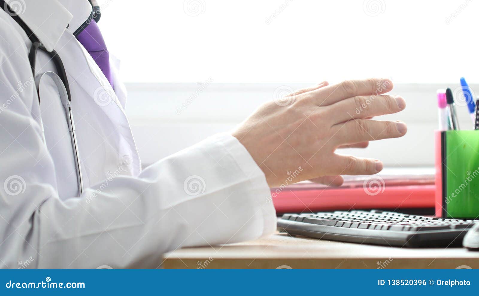 A Doctor Explaining Something by Making Hands Gestures Stock Photo ...
