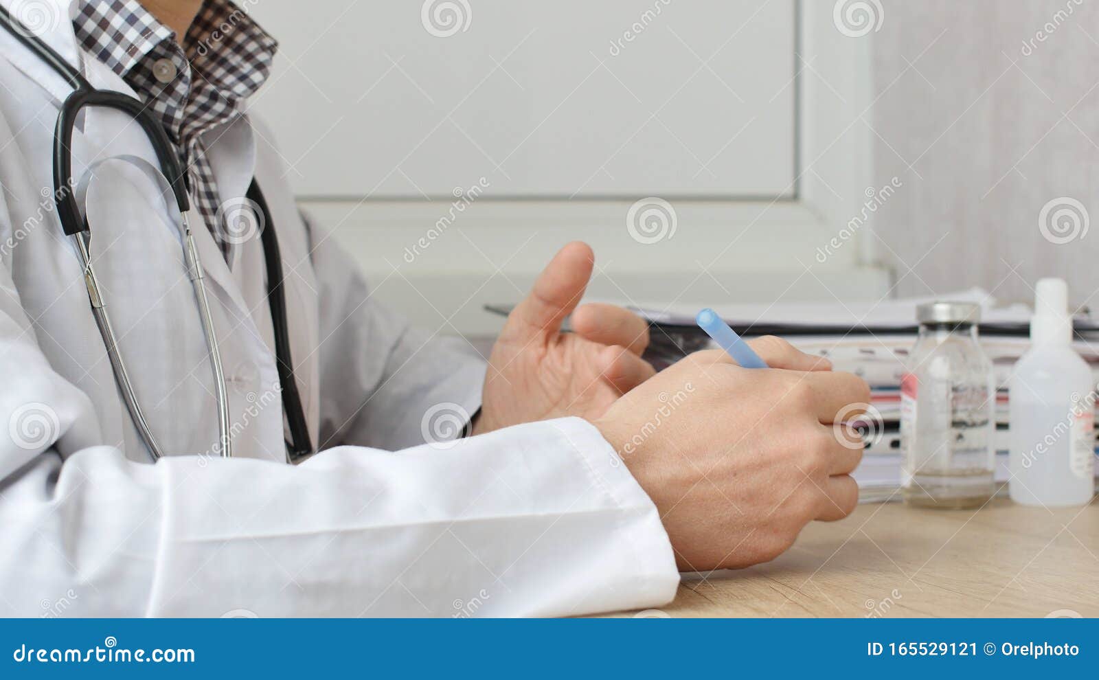 The Doctor Explaining Something for Patient by Making Hands Gestures ...