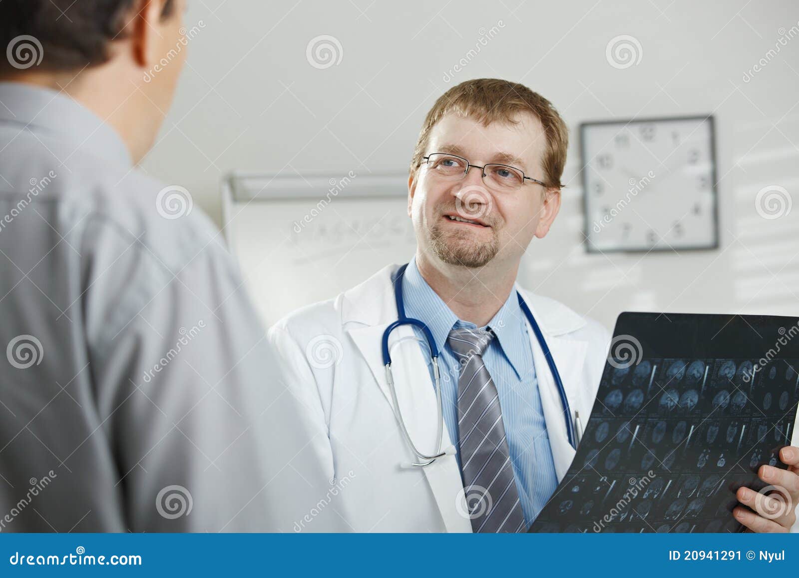 Doctor Explaining To Patient Stock Image - Image of doctors, health ...